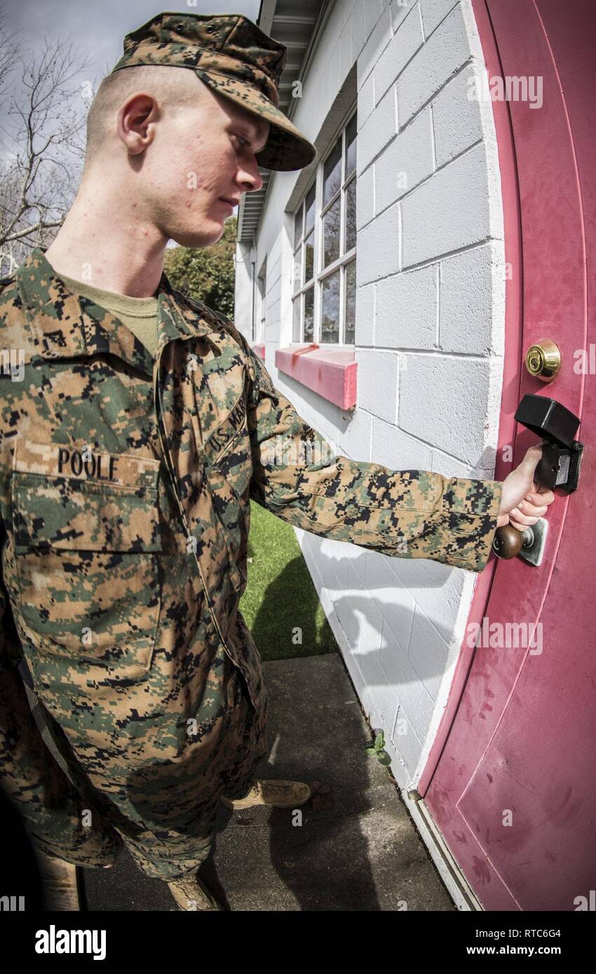 Lance Cpl. Trevor J. Poole, an optics technician with Combat Logistics ...