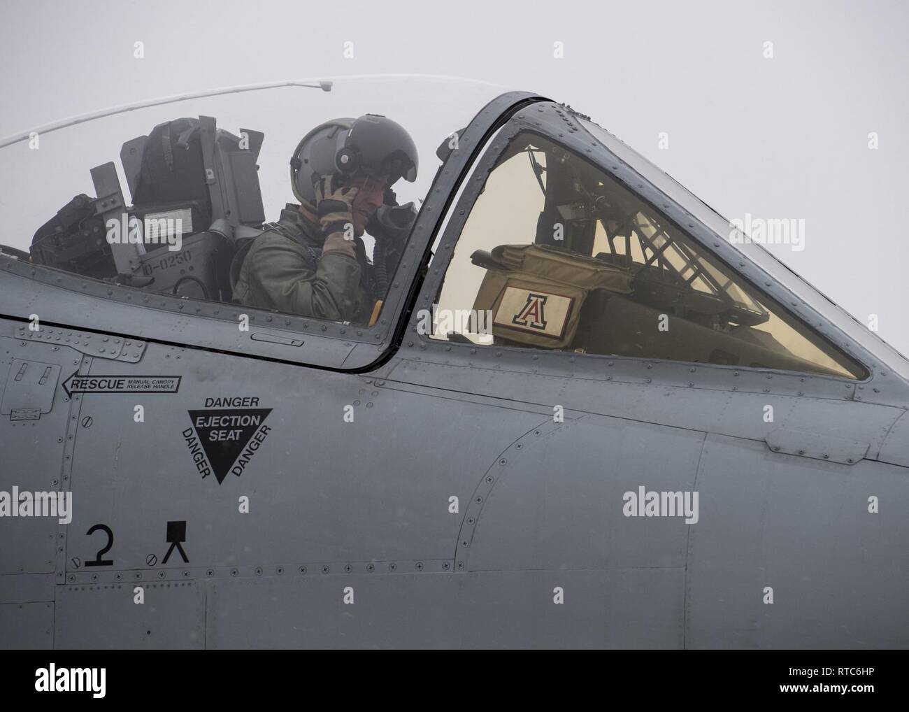 A pilot from the 190th Fighter Squadron prepares to taxi during a unit ...
