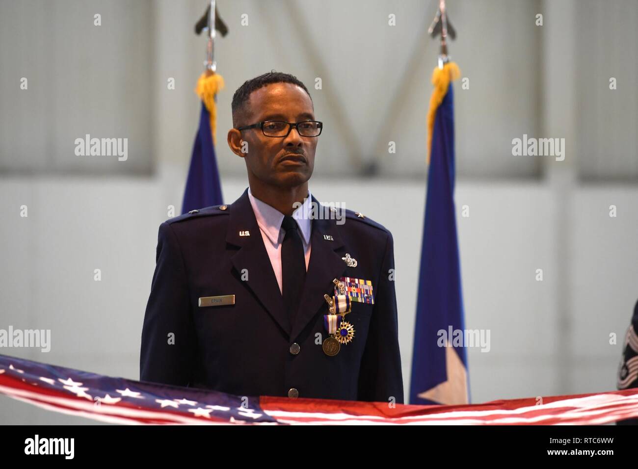 U.S. Air Force Brig. Gen. Clarence Ervin stands at attention as members of 145th Force Support ...