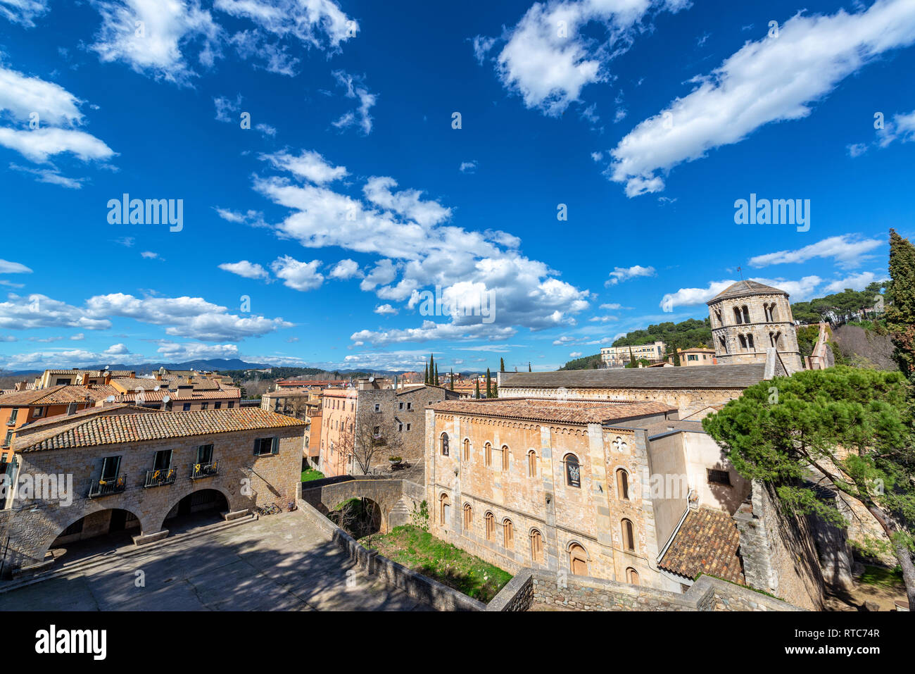 Cityscape view of Girona, Spain with historic monastery on the ...