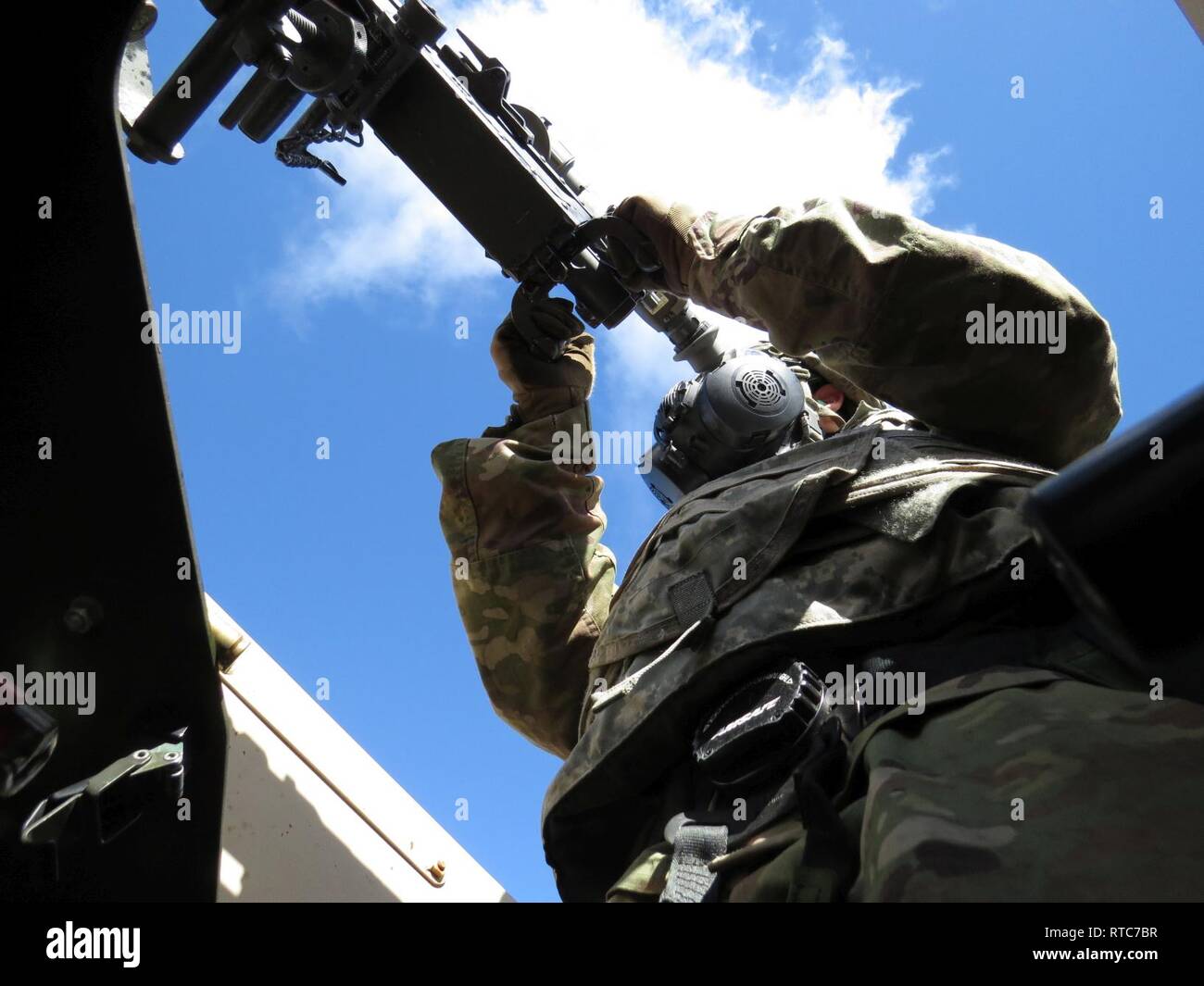 U.S. Army Reserve Spc. Eric Garibay, a HMMWV gunner with the 242nd ...