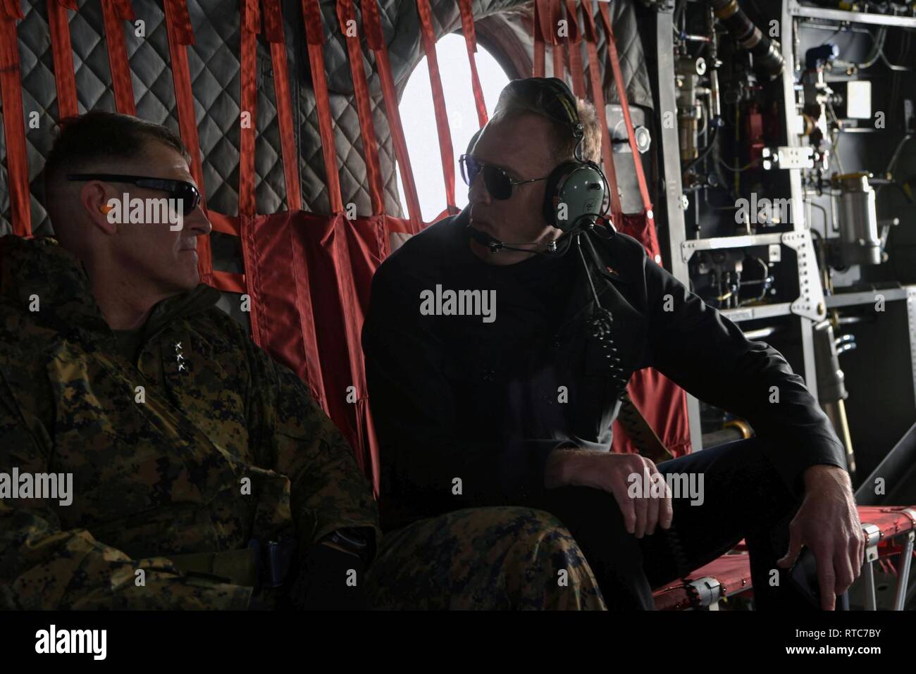 U.S. Acting Secretary of Defense Patrick M. Shanahan talks with his ...