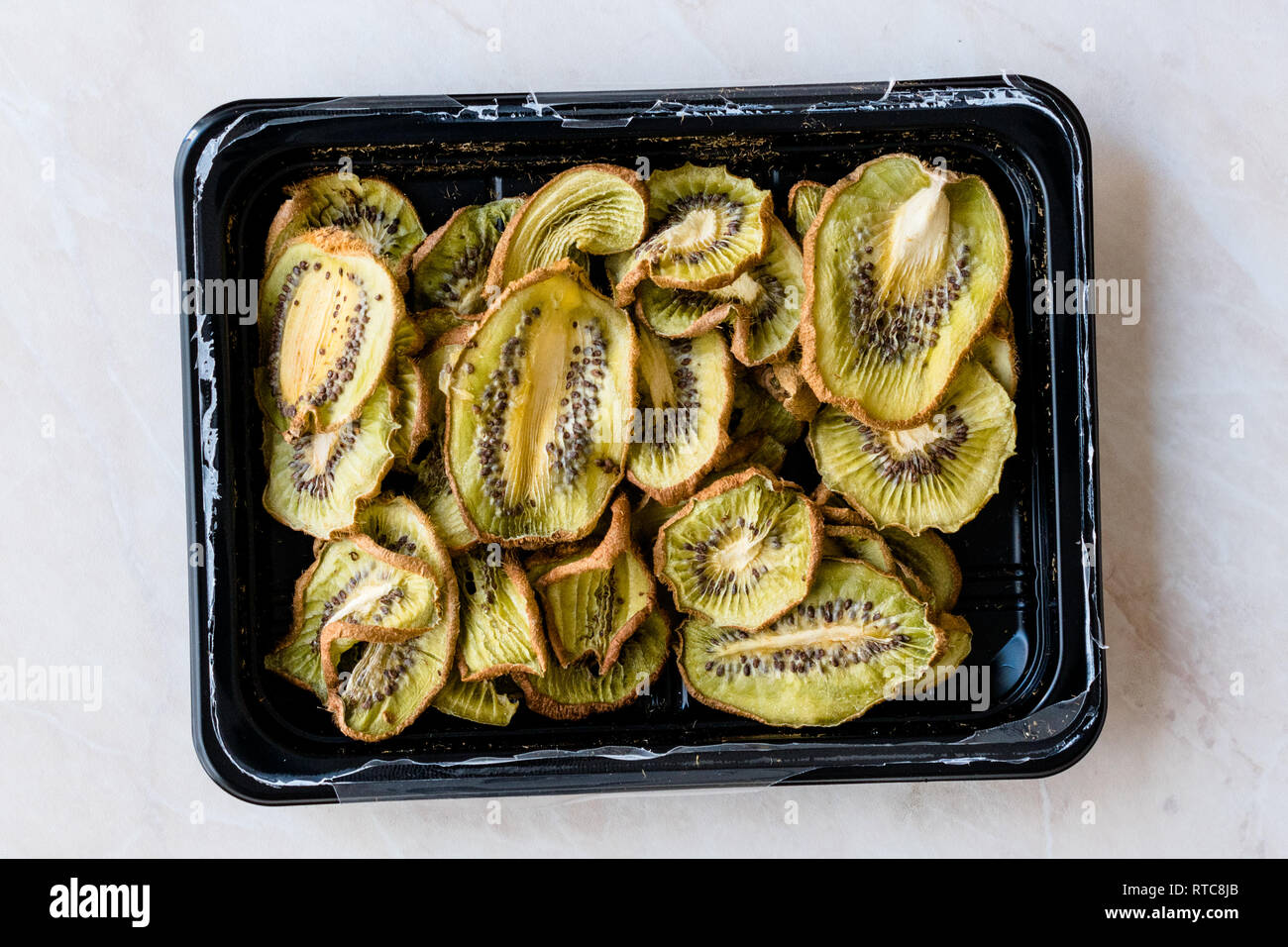 Dried Kiwi Slices / Organic Dry Fruit in Plastic Box / Container ...