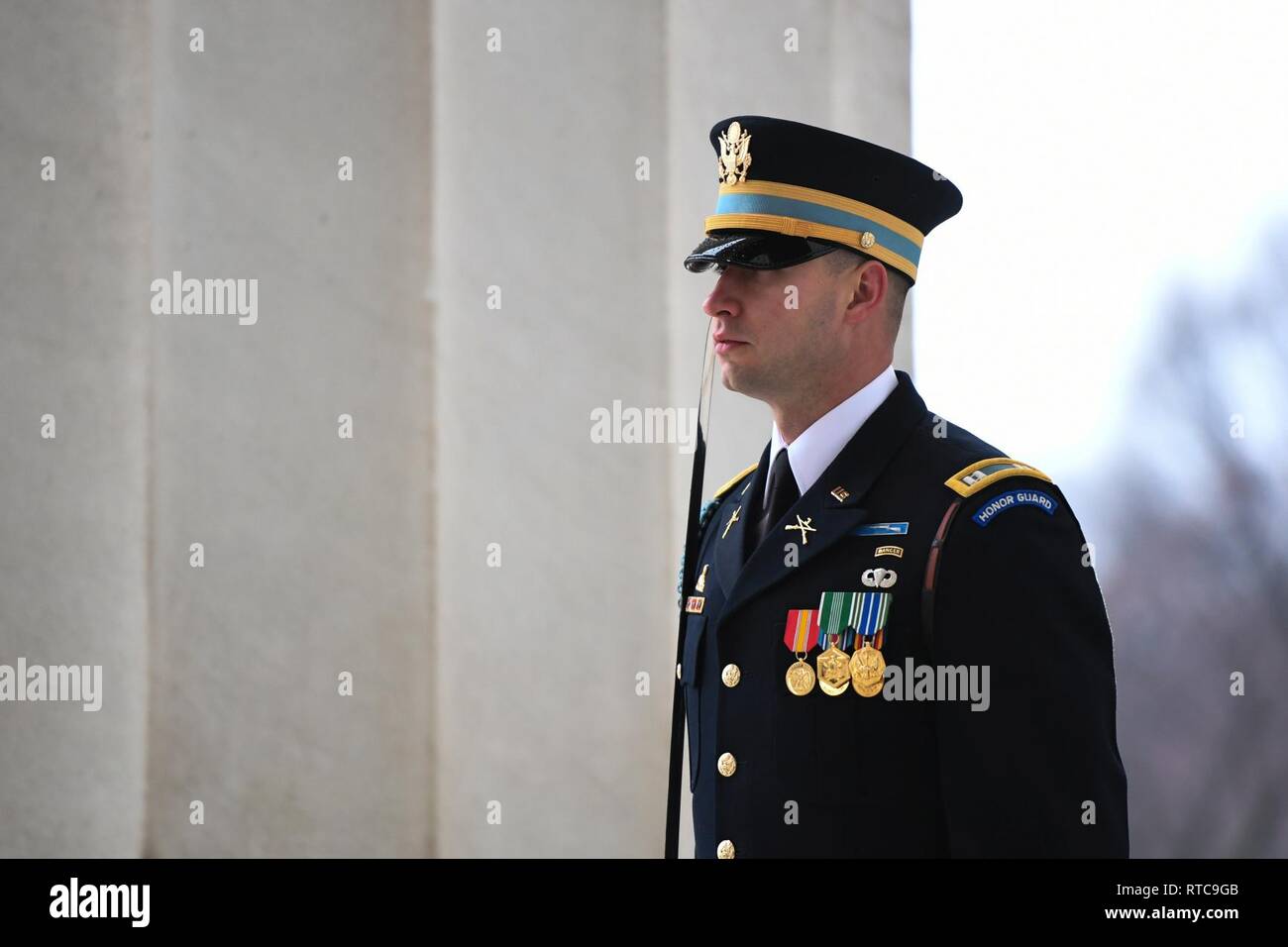 A U.S. Army Honor Guard Soldier stands ready to perform his duties ...