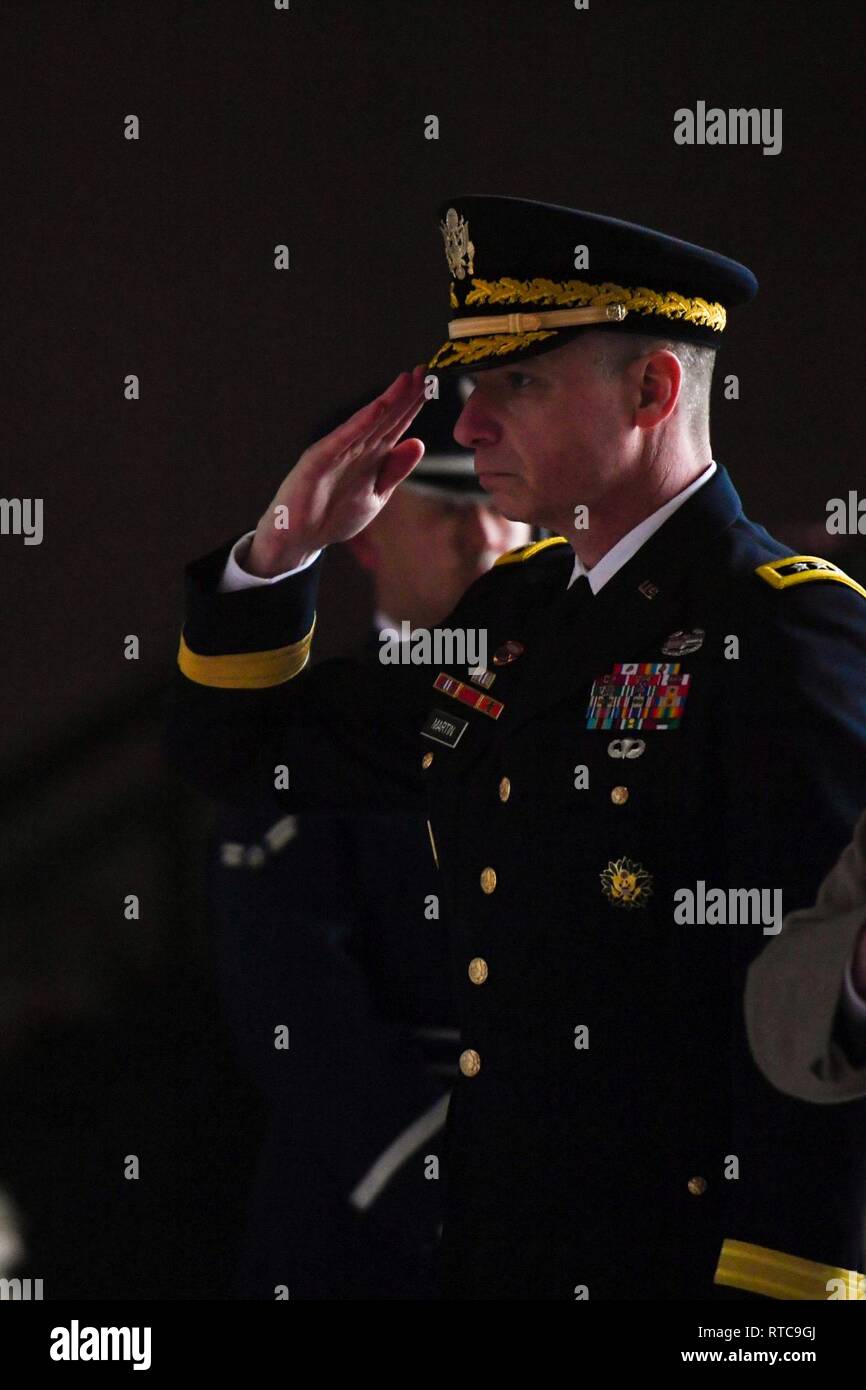 U.S. Army Lt. Gen. Joseph M. Martin, director of the Army Staff, lays a ...