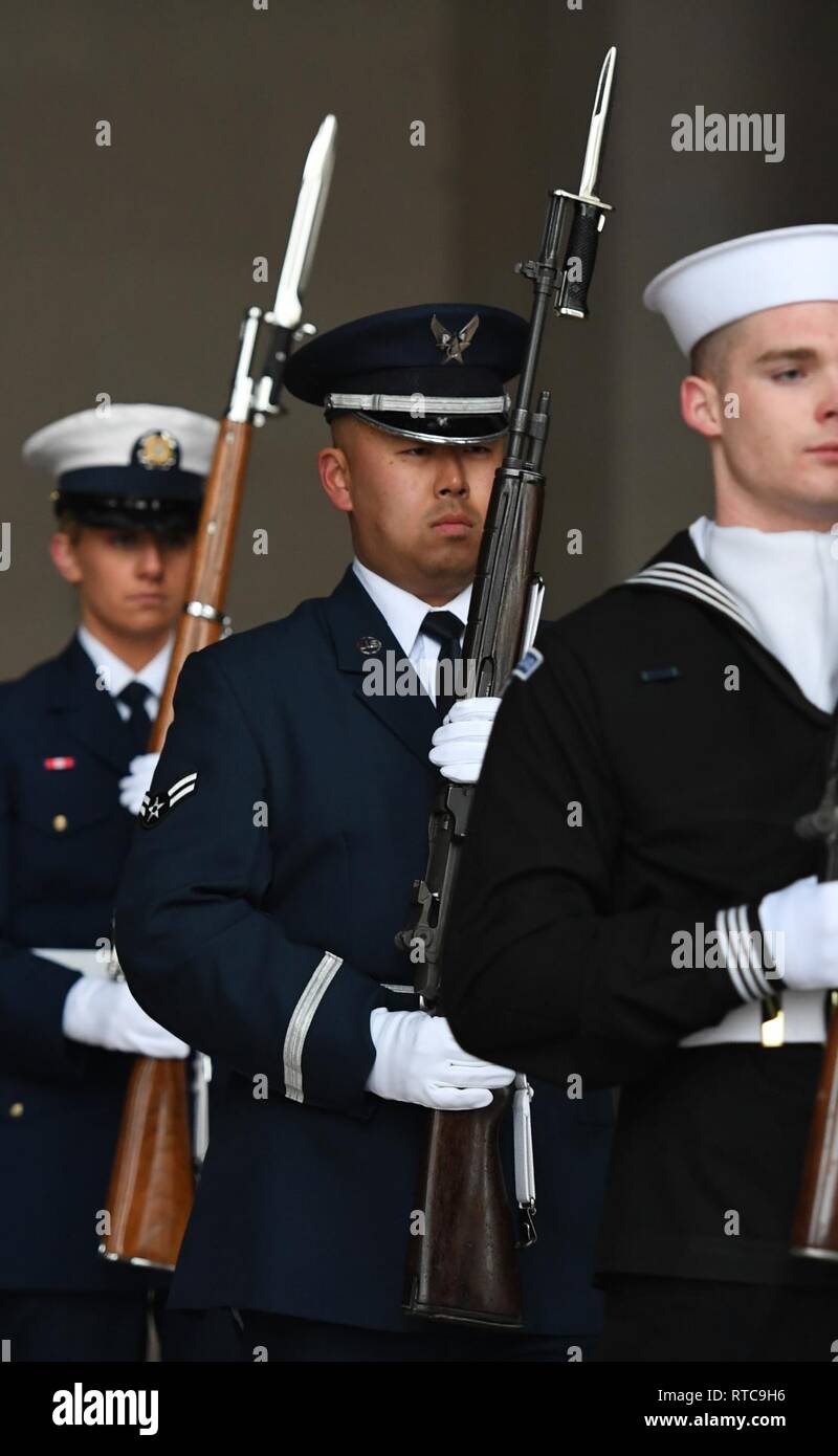 Members of the Joint Armed Forces Honor Guard file out of the Lincoln ...