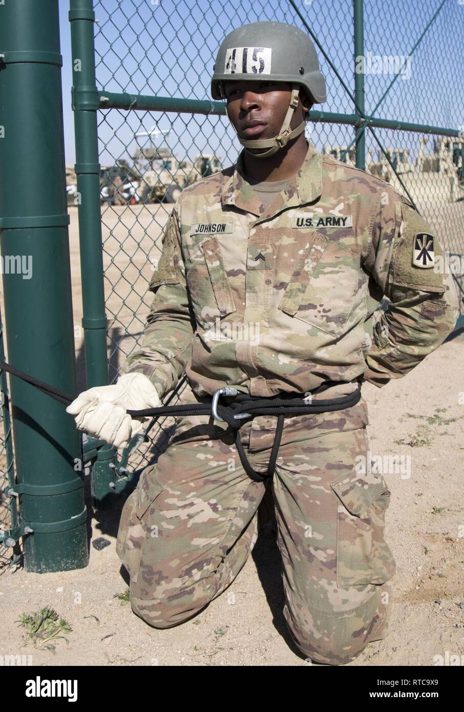 CAMP BUEHRING, Kuwait – United States Army Cpl. Adam Johnson, assigned ...