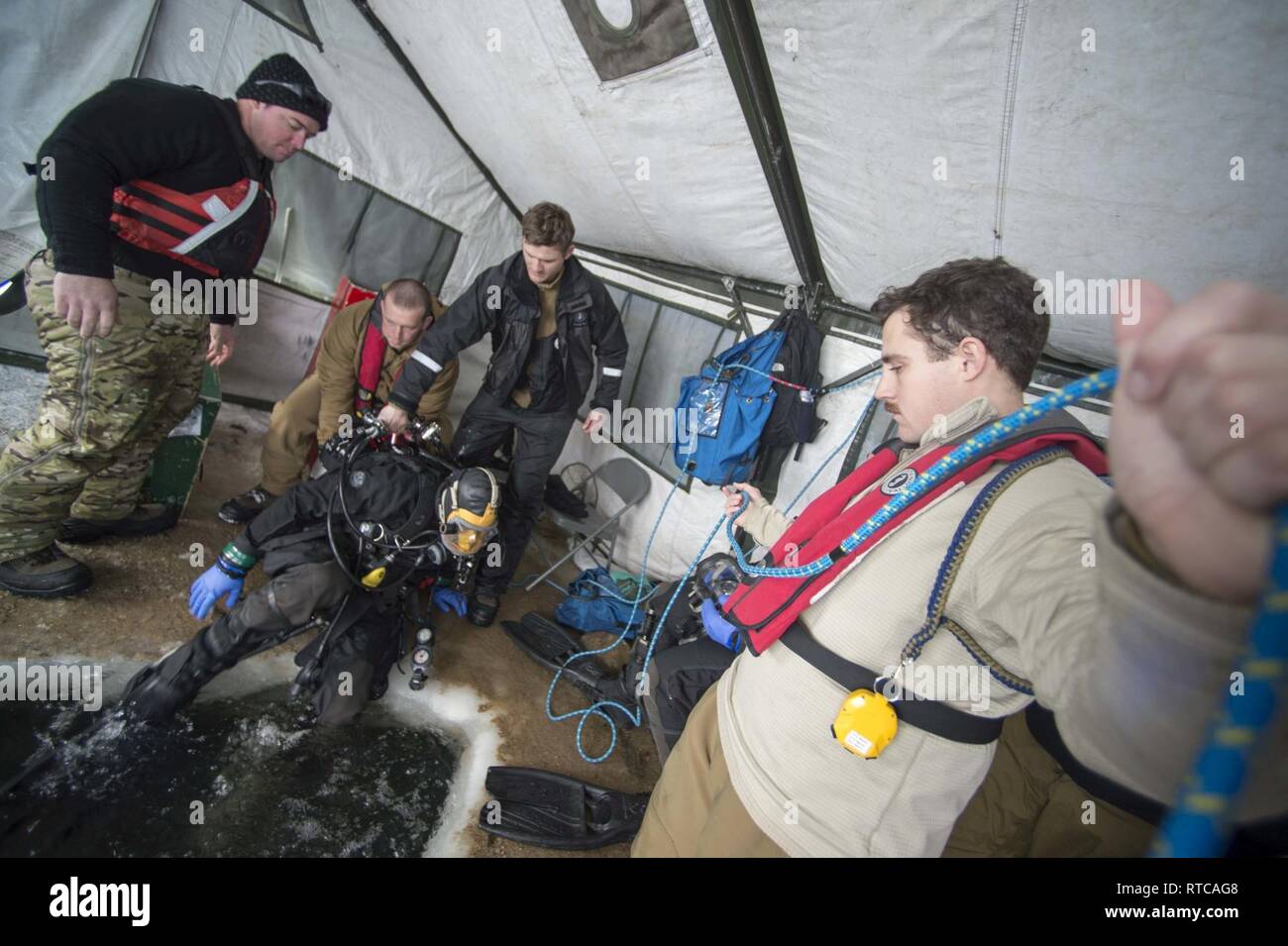 LITTLE FALLS, Minn. (Feb. 12, 2018) A diver assigned to Movile Diving ...