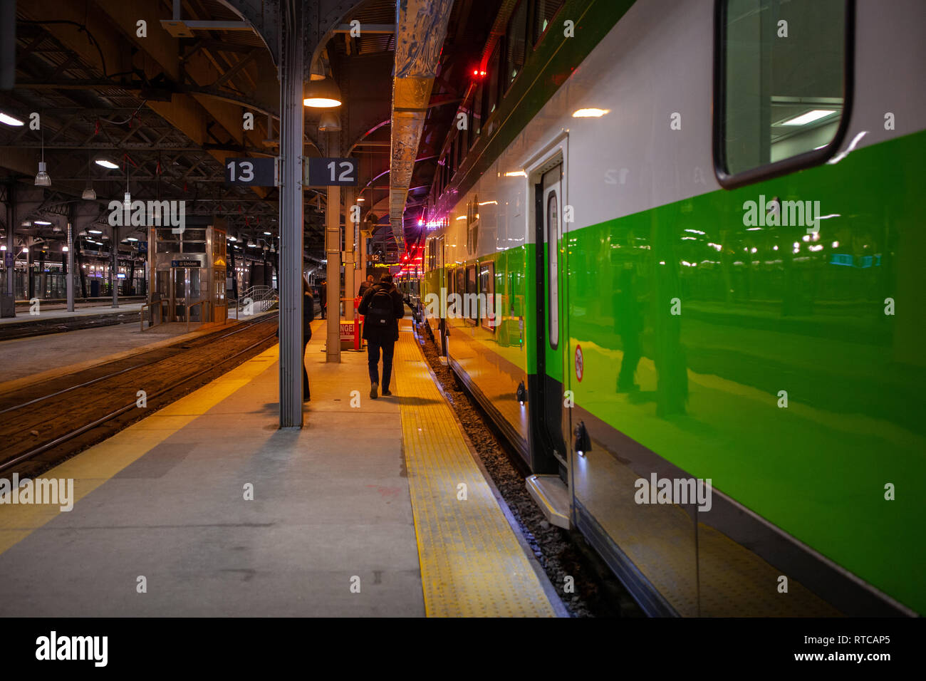 Green wagons of speed Toronto’s GO train at Platform of Union Station ...