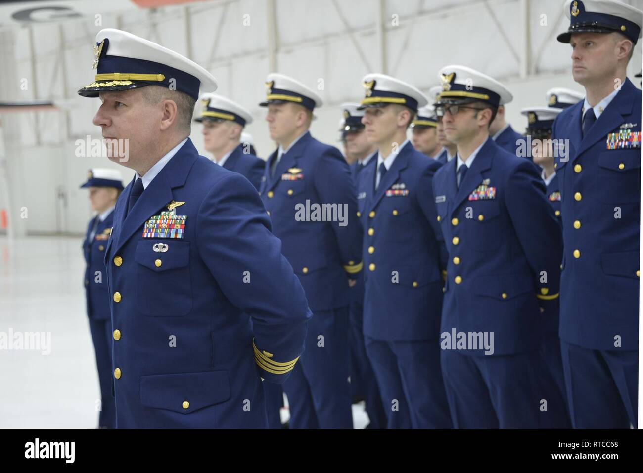 U.S. Coast Guard Cmdr. Steven F. Jensen leads the formation of the Air ...