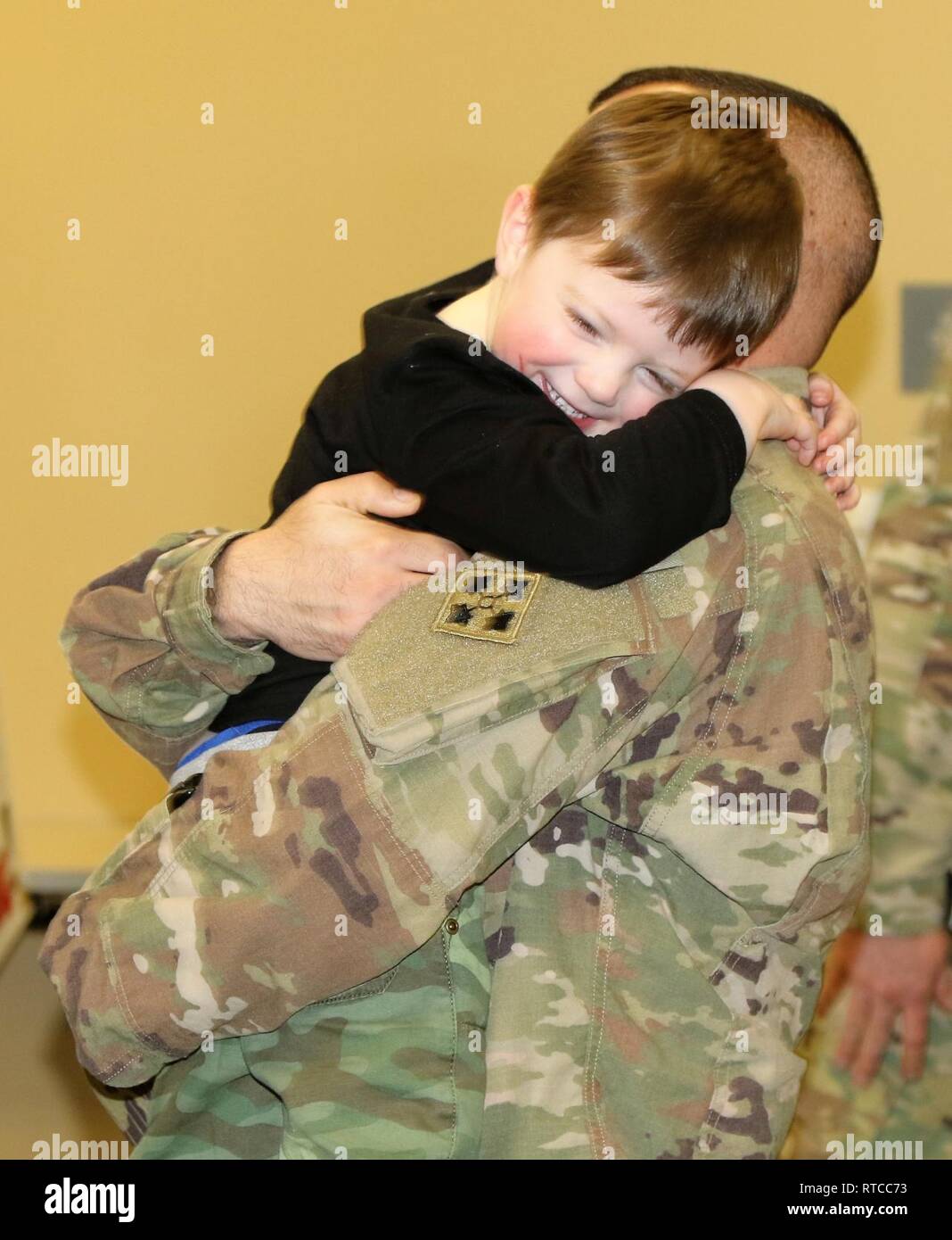 Family members welcome home soldiers from 60th Ordinance, 68th Combat ...