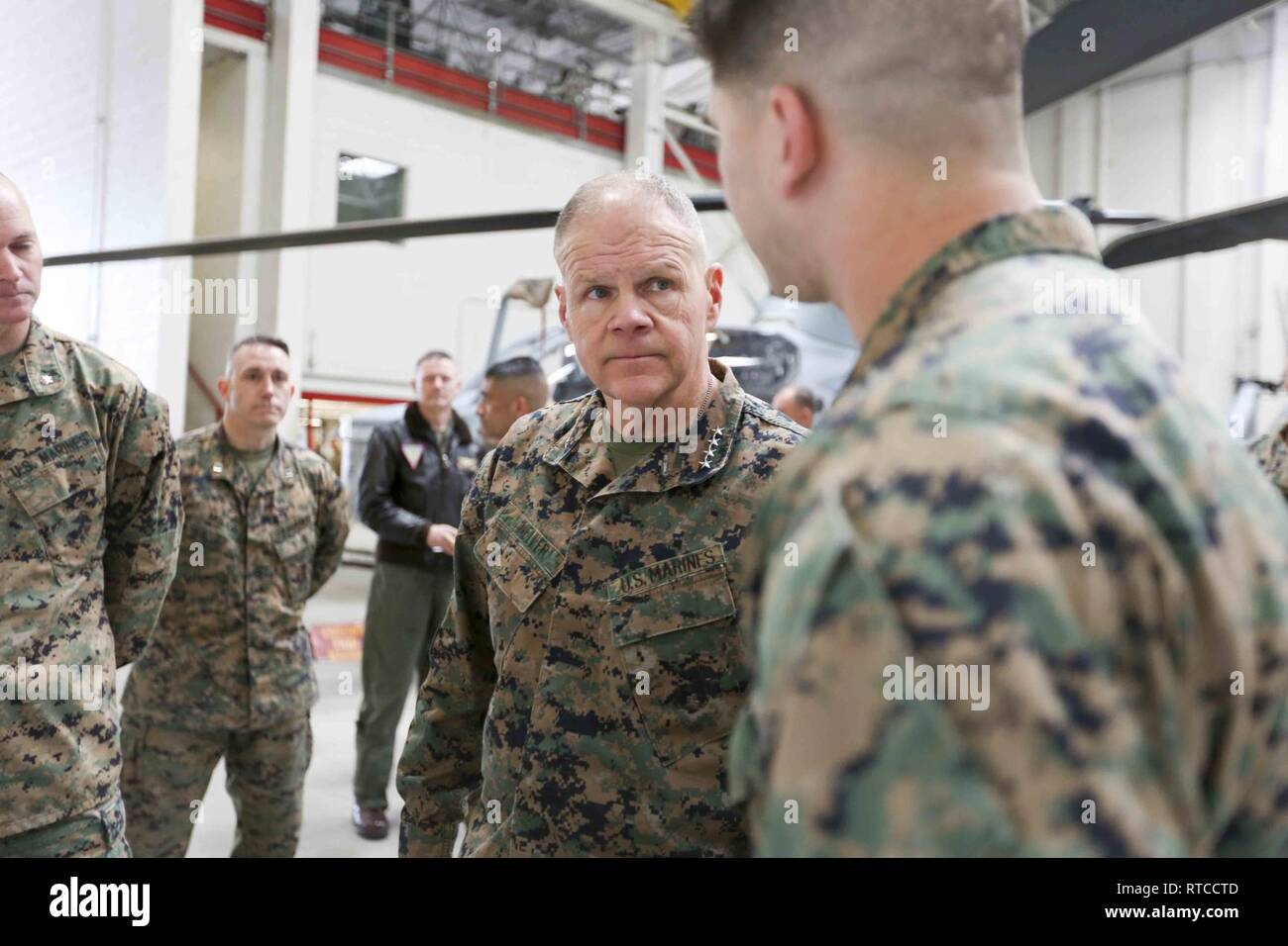 Commandant of the Marine Corps Gen. Robert B. Neller speaks with a ...