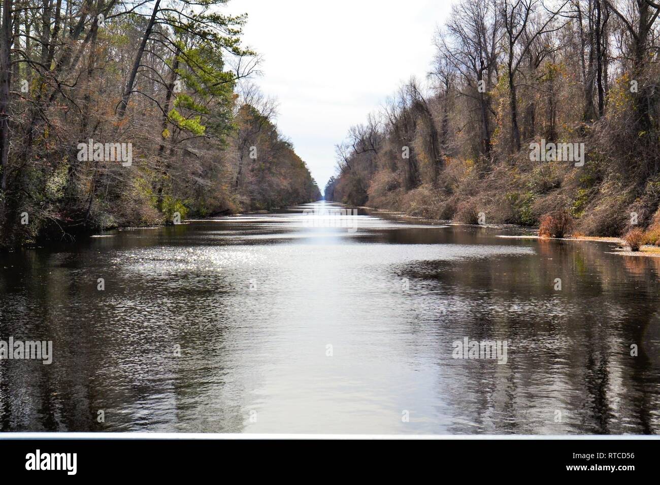 The water is calm at the Deep Creek lock on the Dismal Swamp Canal ...