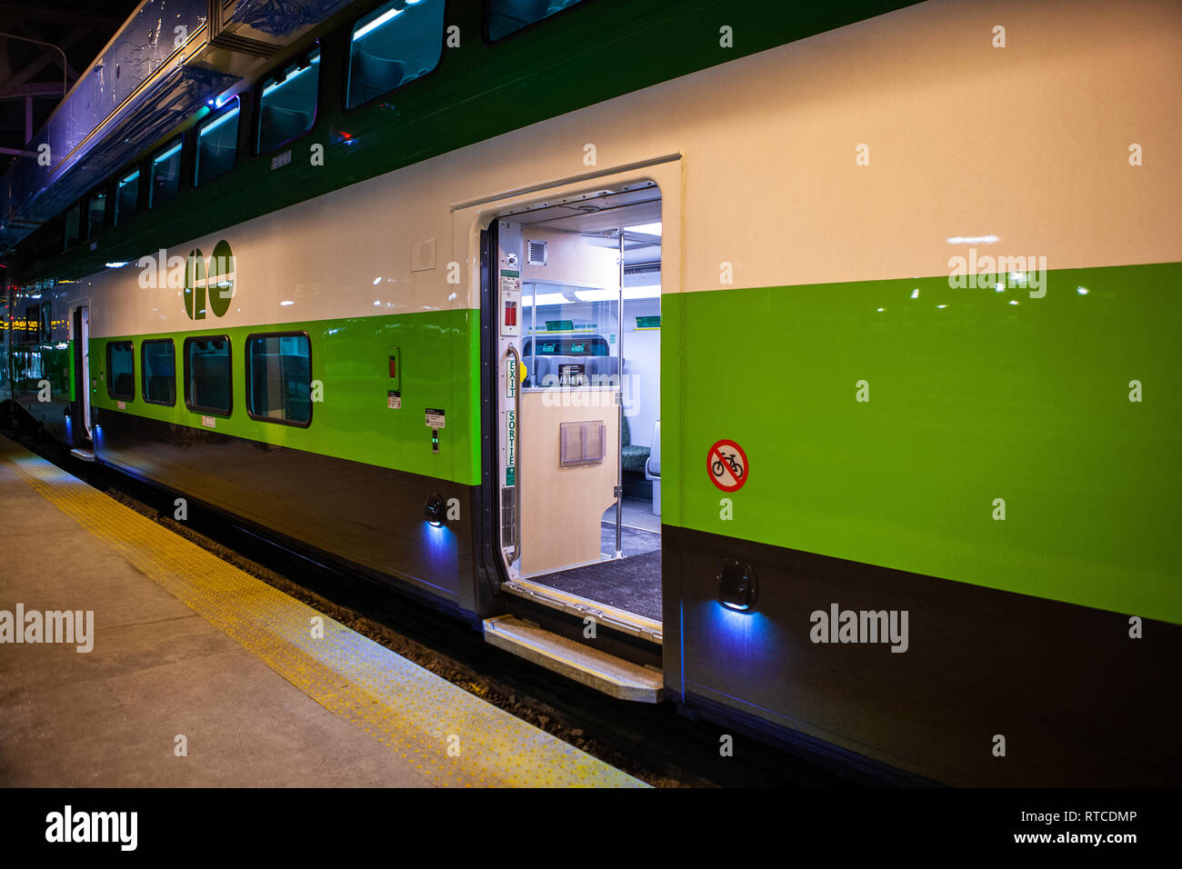 Green wagons of speed Toronto’s GO train at Platform of Union Station ...