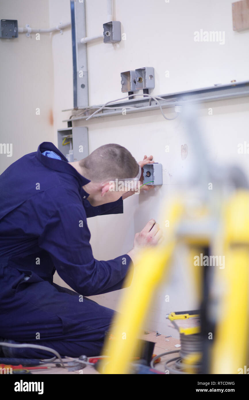 students at a further education college learning how to become an ...