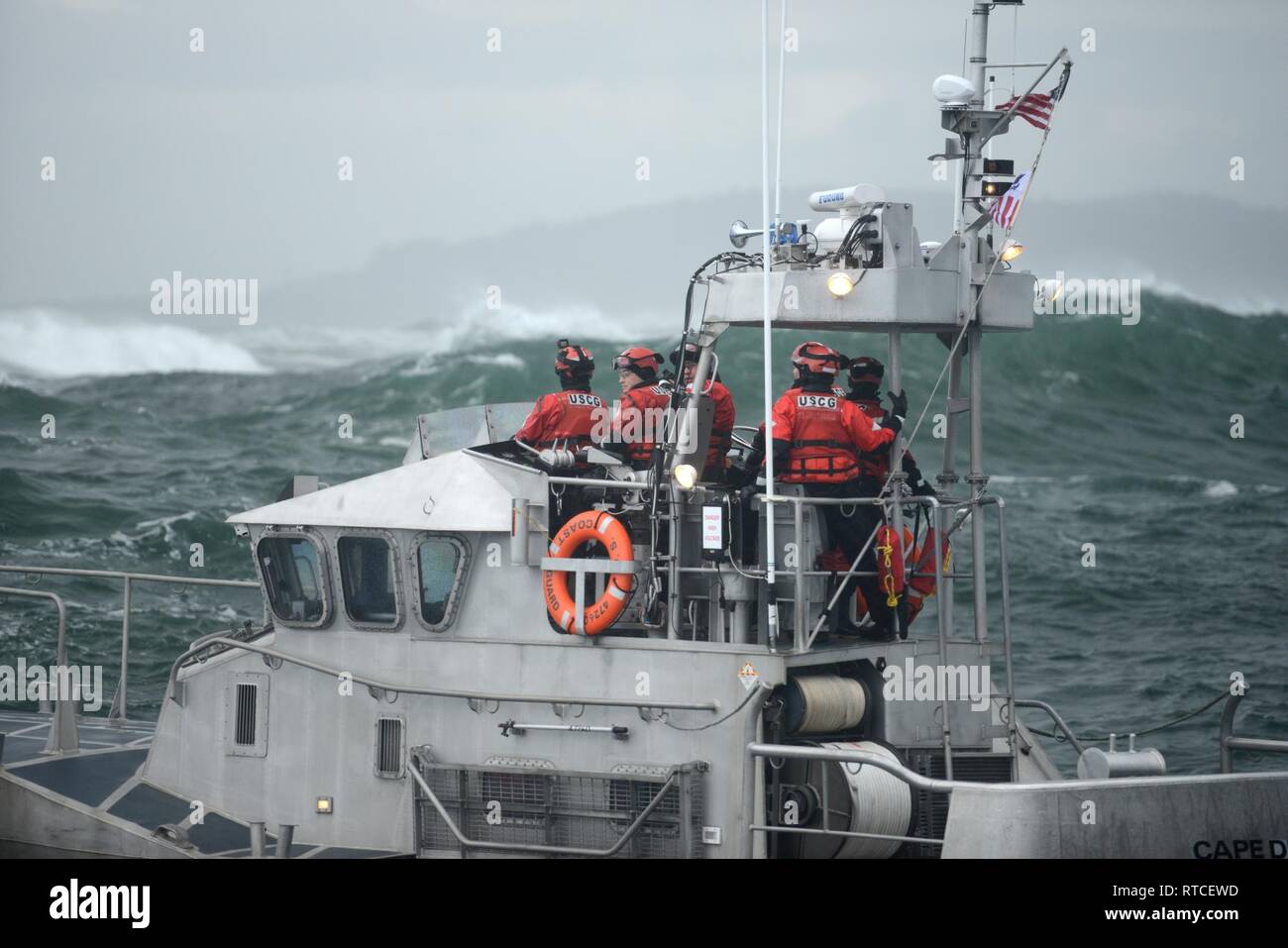 A Coast Guard Station Cape Disappointment 47-foot Motor Life Boat crew ...