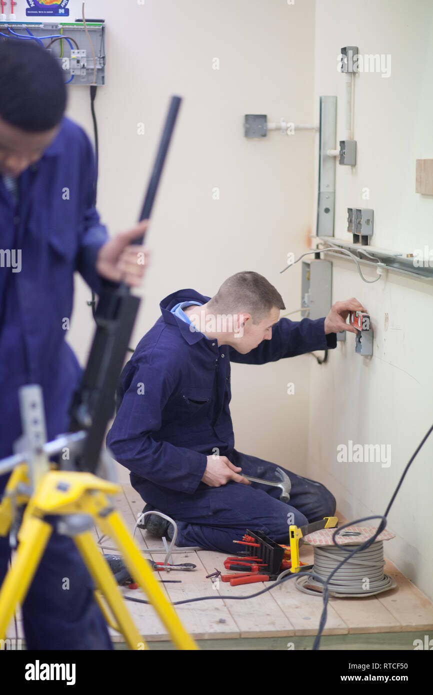 students at a further education college learning how to become an ...