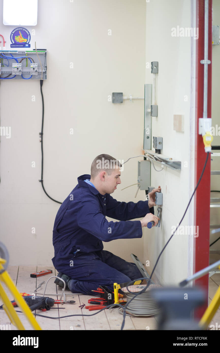 students at a further education college learning how to become an ...