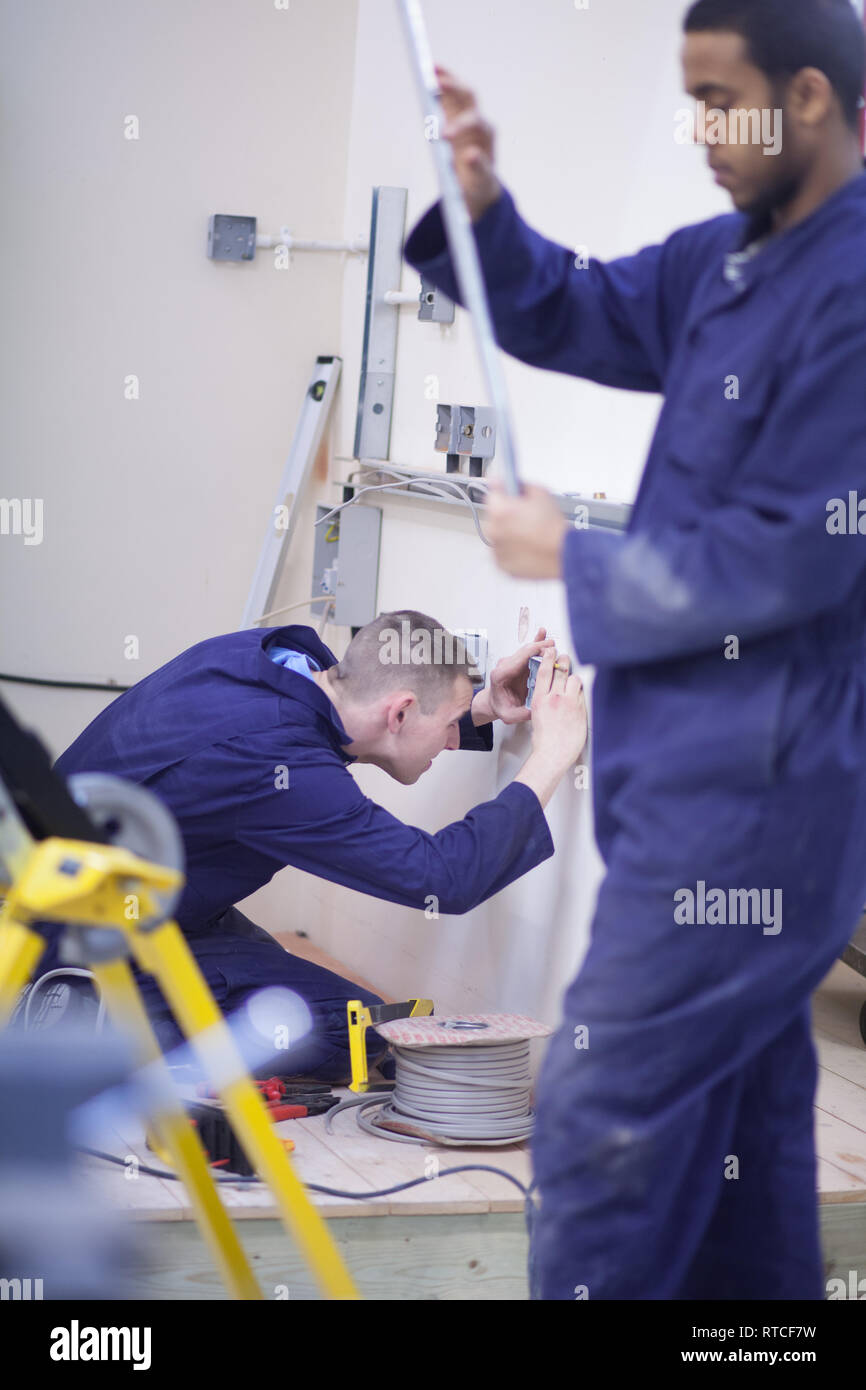 students at a further education college learning how to become an ...