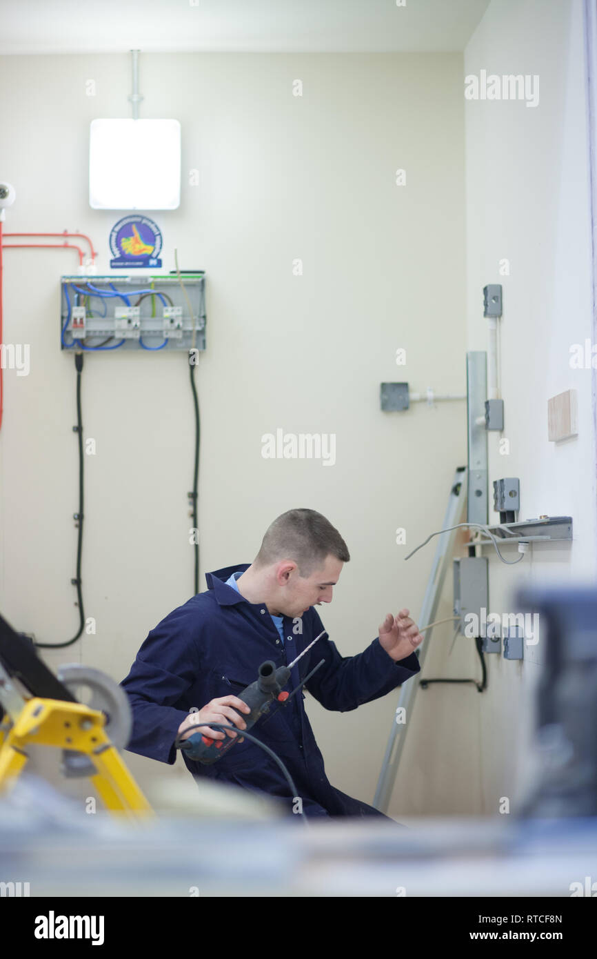 students at a further education college learning how to become an ...