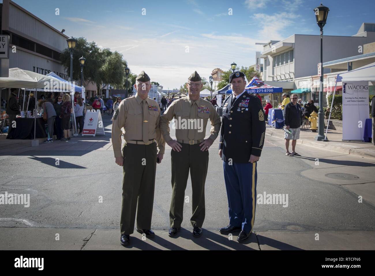 U.S. Marine Corps Col. David A. Suggs (center), commanding officer ...