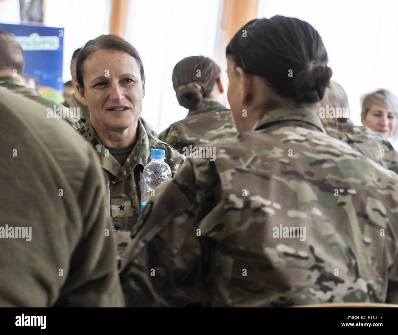 Newly promoted Brig. Gen. Michelle Schmidt talks with Spc. Shannon ...