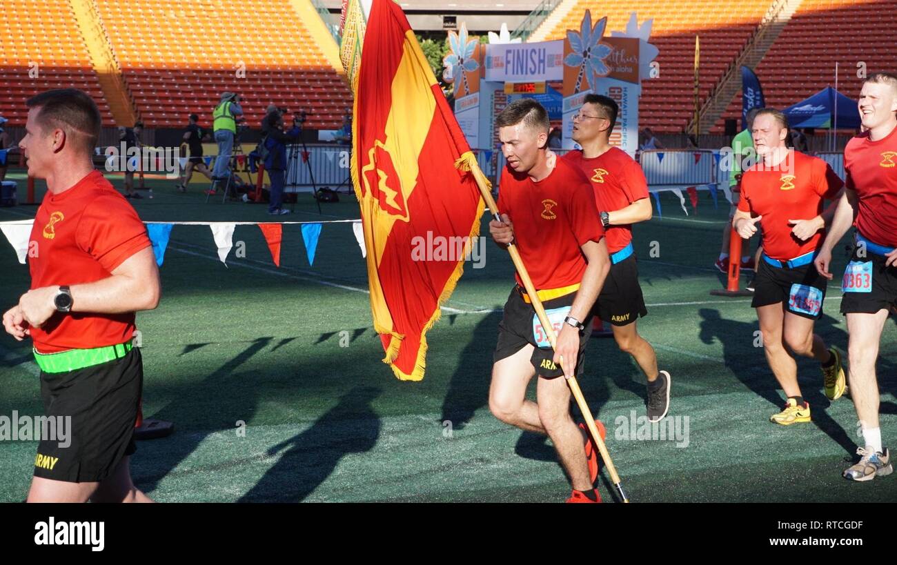 The 25th Infantry Division Artillery Soldiers cross the finish line ...