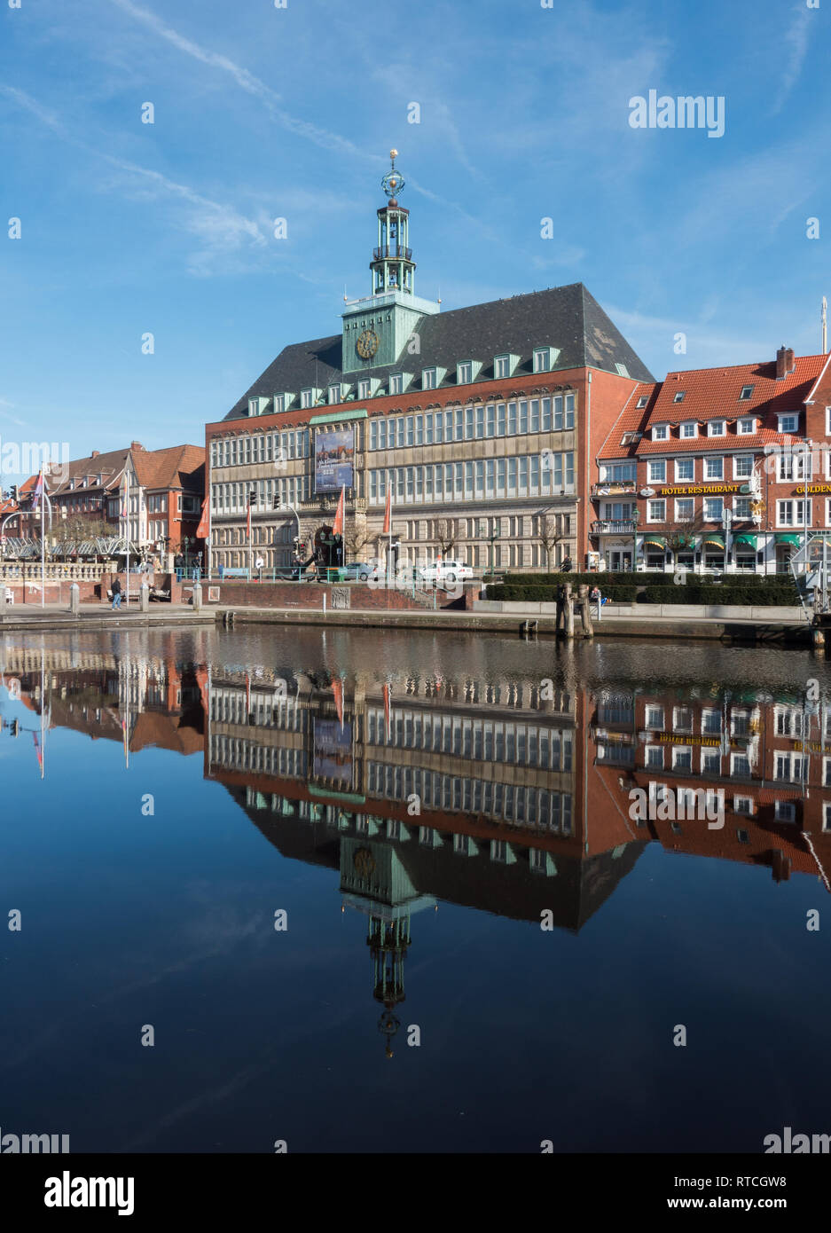 The City Hall reflected in the harbours water. Emden, East Frisia ...