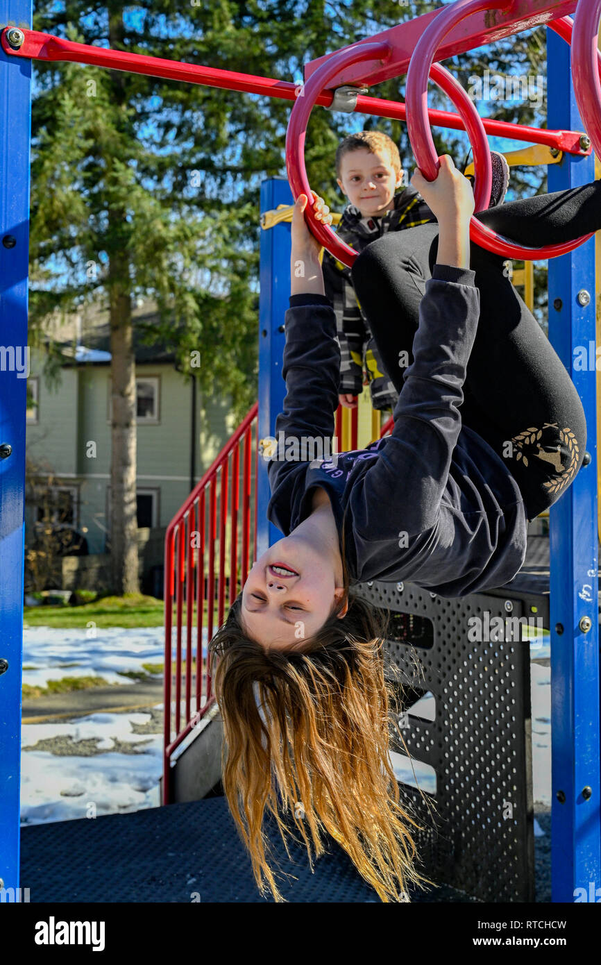 Girl hanging upside down on hi-res stock photography and images - Alamy