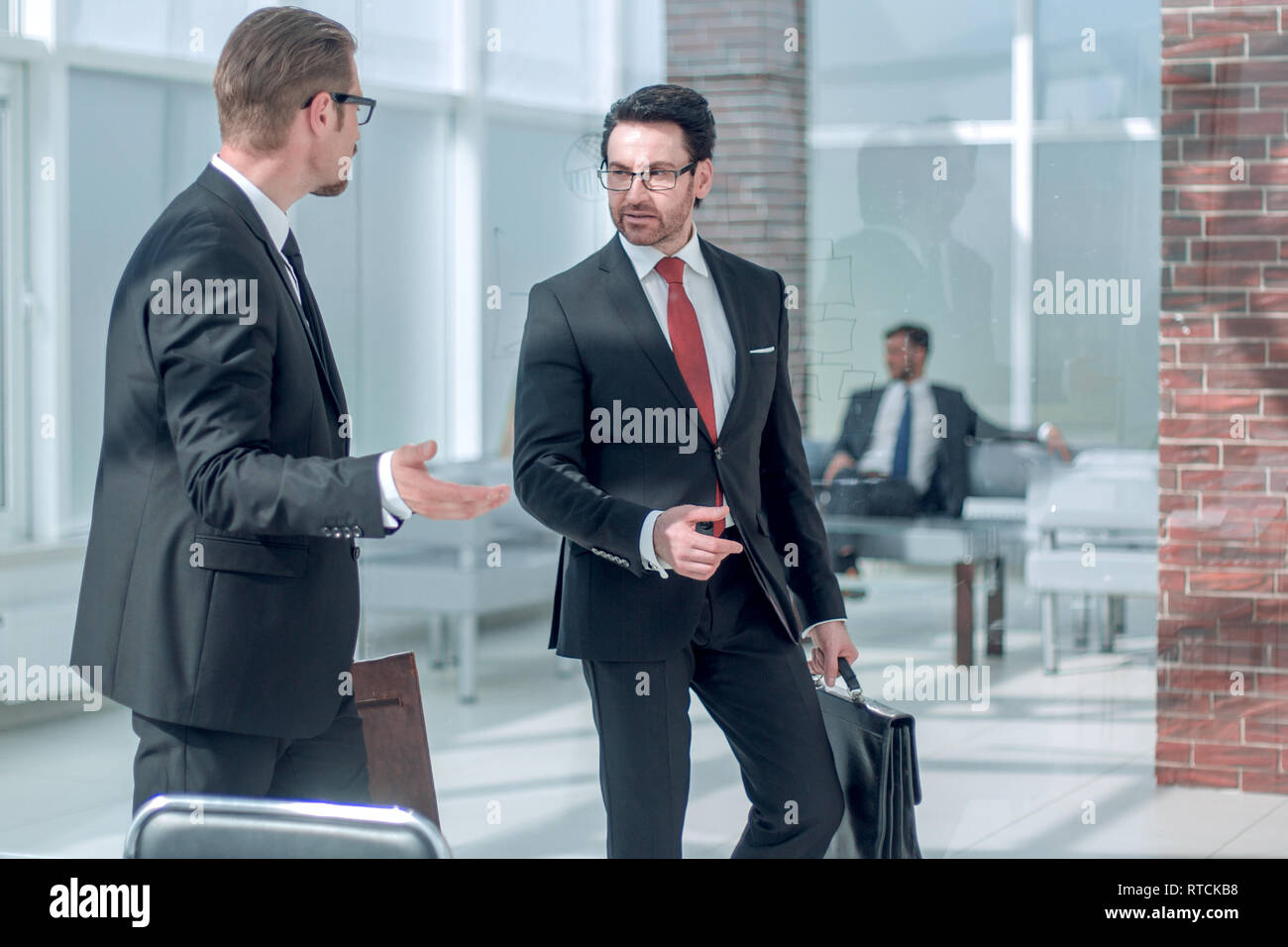 Manager meets the client at the Bank office Stock Photo - Alamy