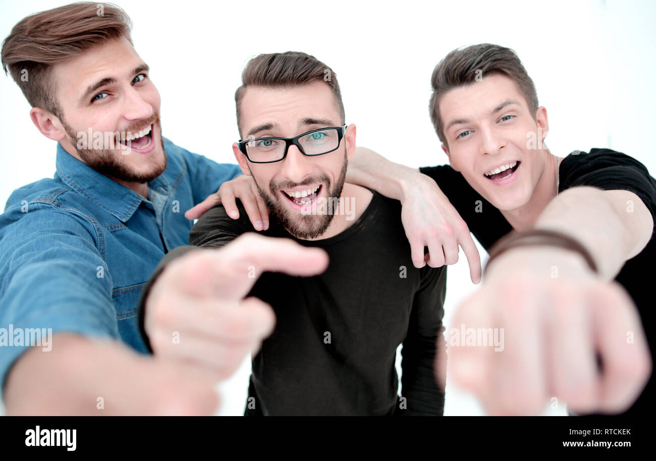 group of smiling male friends pointing at you Stock Photo - Alamy