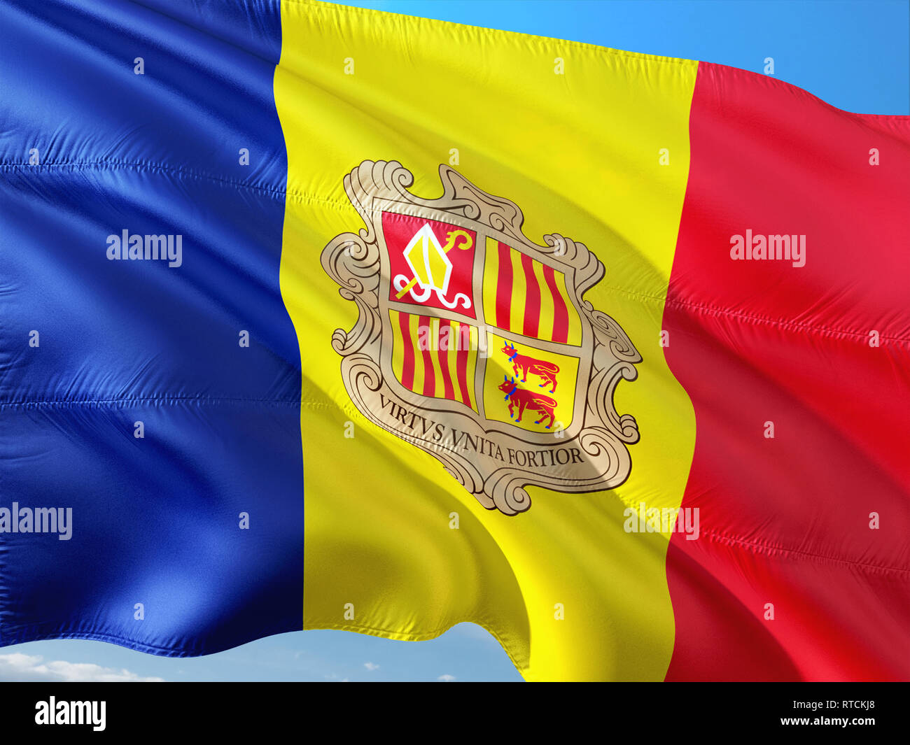Flag of Andorra waving in the wind against deep blue sky. High quality ...