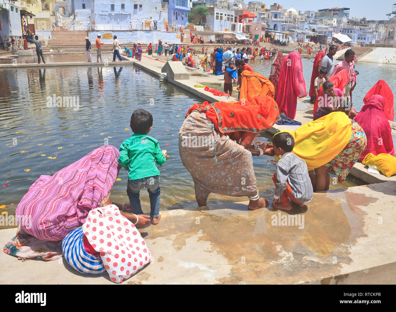 Ritual bathing in the holy lake in Pushkar. India Stock Photo - Alamy