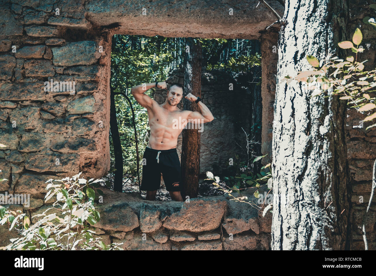 Young bodybuilder posing and relaxing in nature in lower austria Stock ...