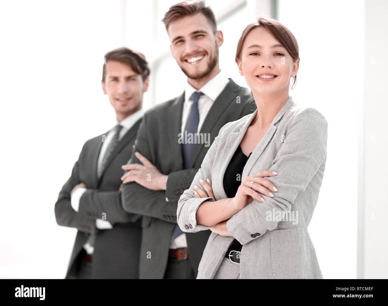 company employees standing together Stock Photo - Alamy