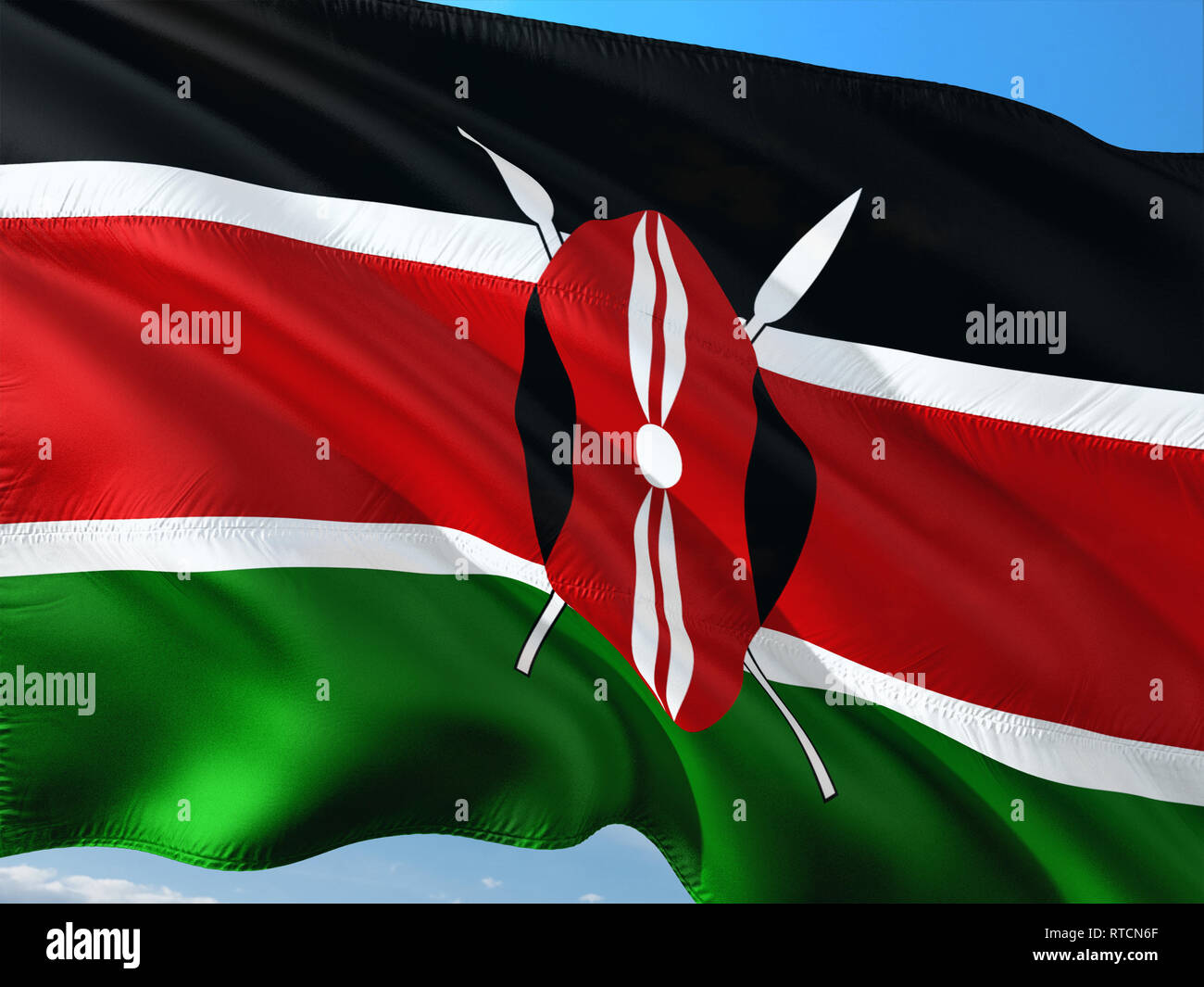 Flag of Kenya waving in the wind against deep blue sky. High quality ...