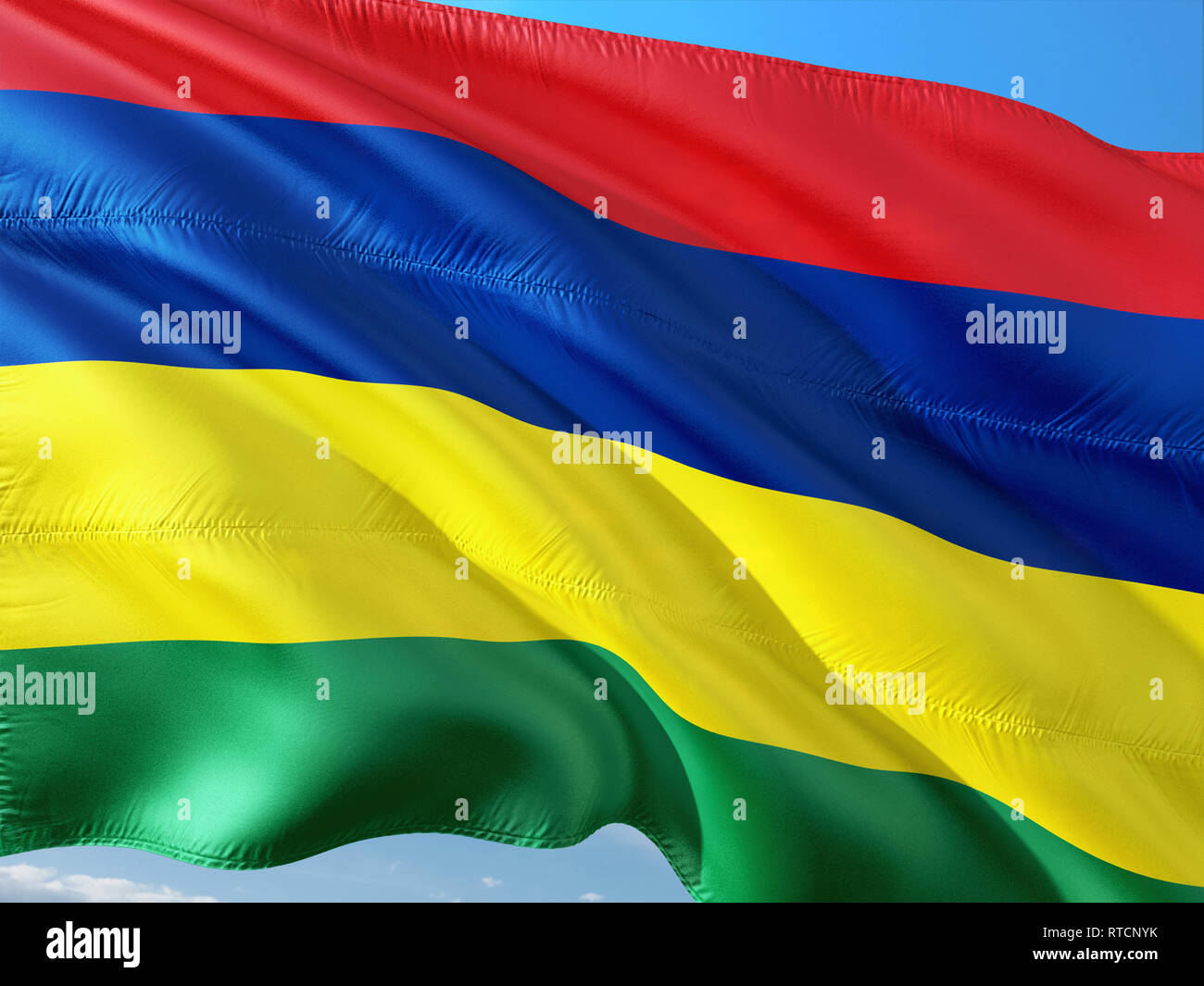 Flag of Mauritius waving in the wind against deep blue sky. High ...