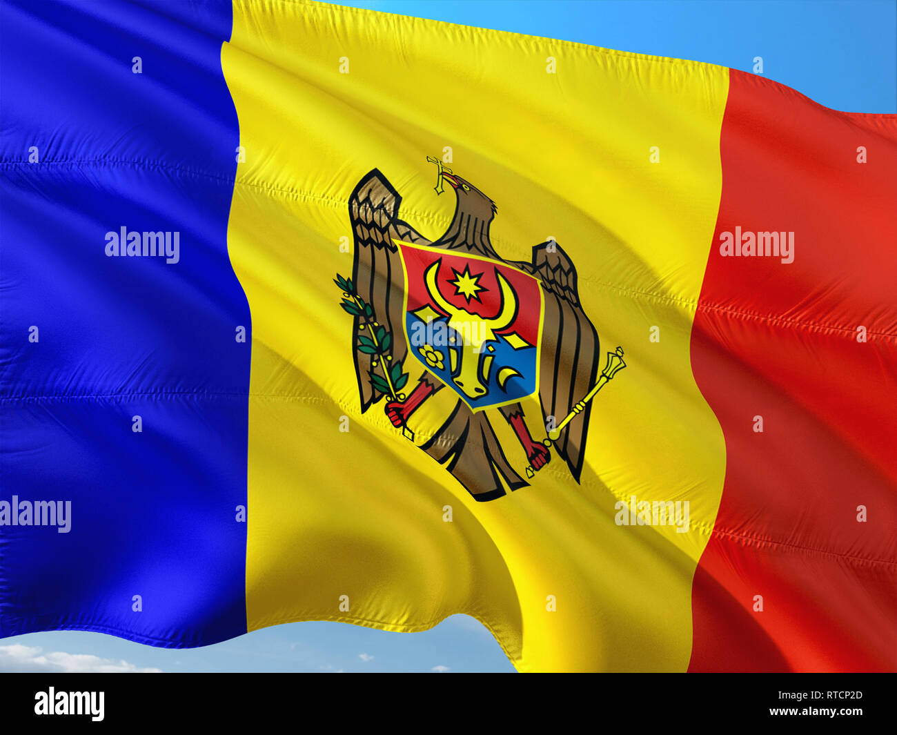 Flag of Moldova waving in the wind against deep blue sky. High quality ...