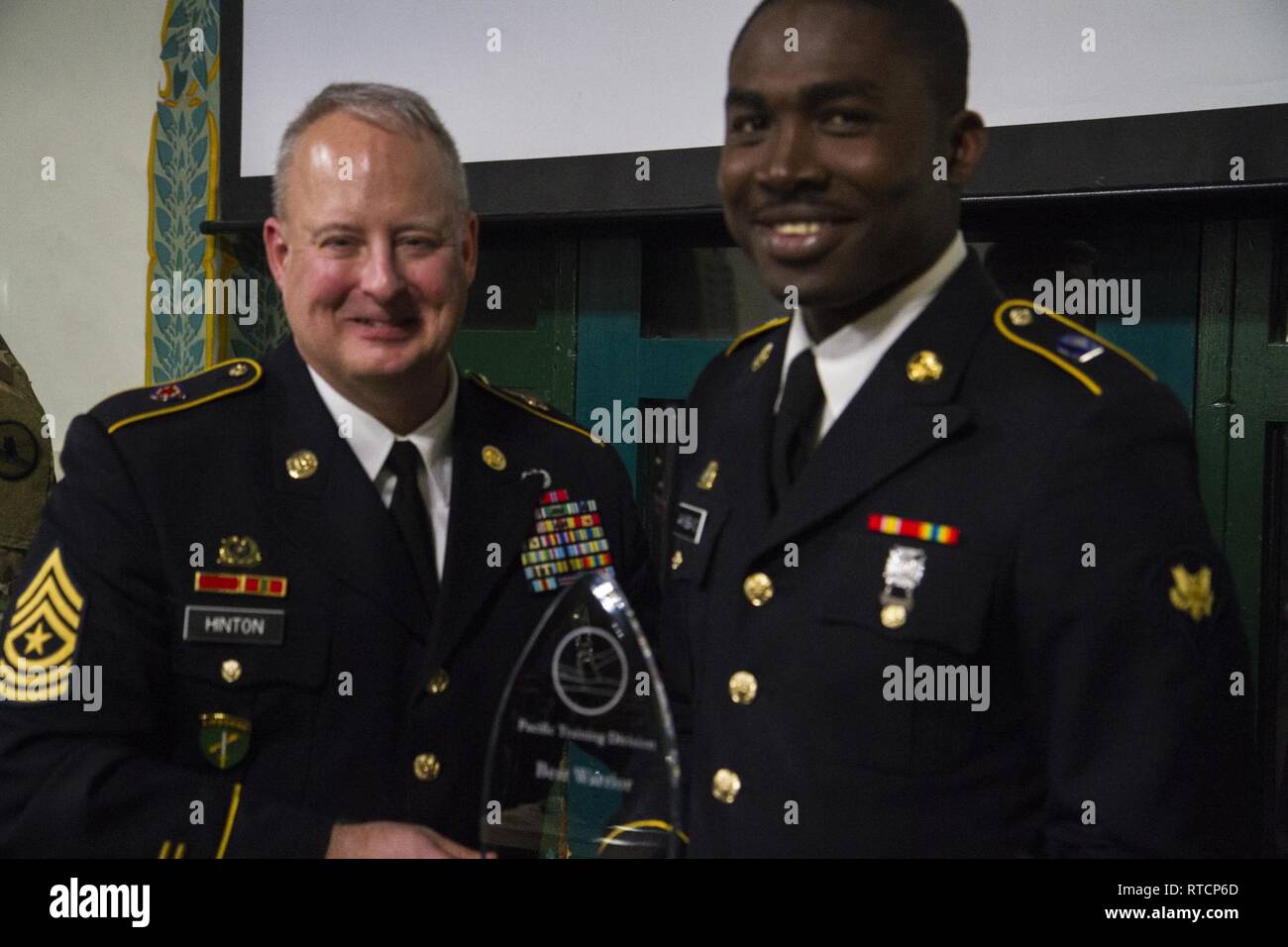 U.S. Army Sgt. Maj. Scott Hinton (left), Pacific Division (PACDIV) 84th ...