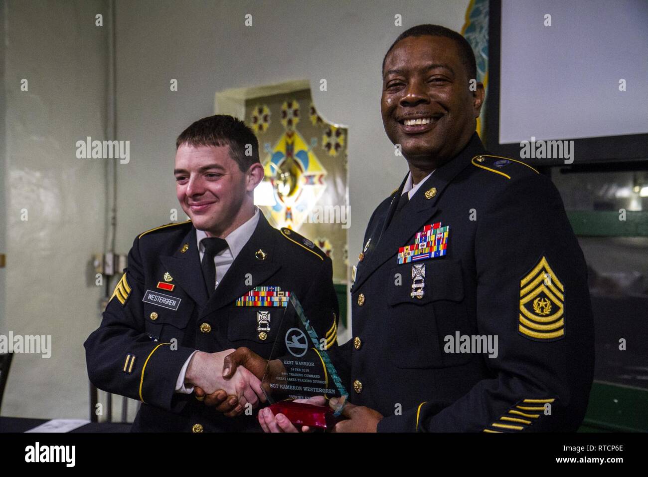U.S. Army Sgt. Kameron Westergren (left), Great Lakes Training Division ...