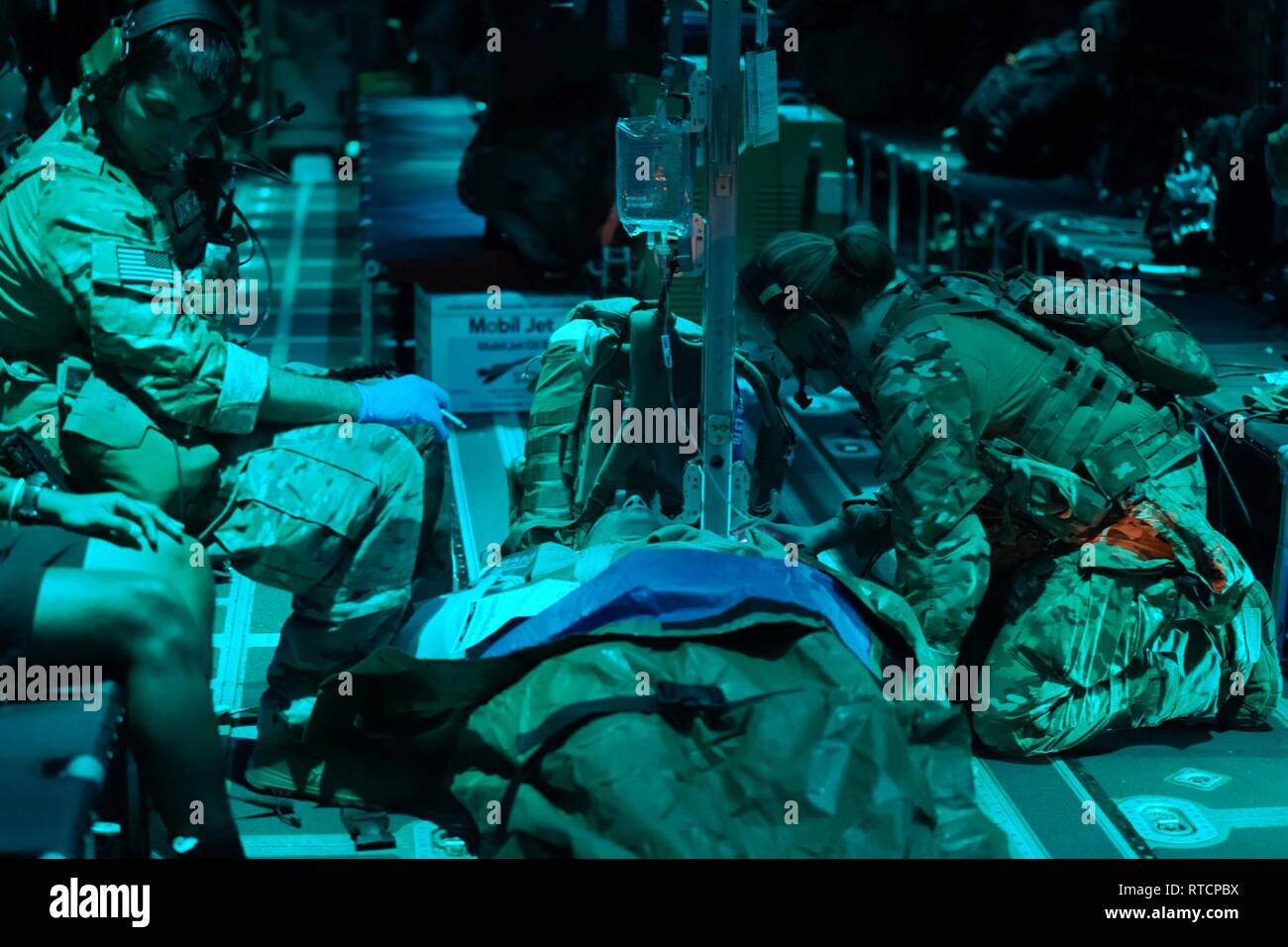 Capt Jonathan Campbell and Technical Sargent Jennifer Chilson assess ...