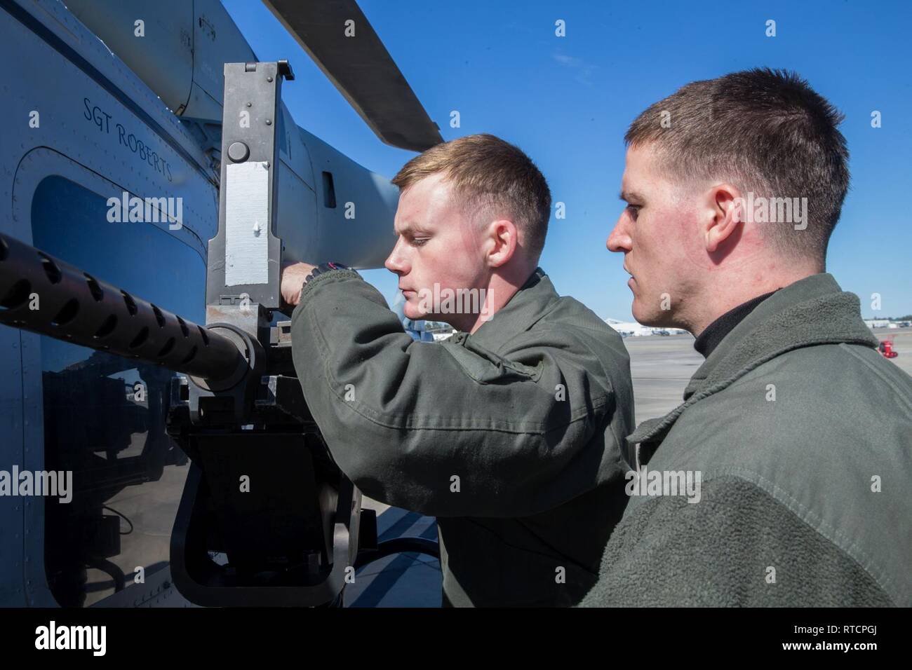 U.S. Marines Sgt. Jimmy Roberts, right, and Lance Cpl. Matthew Dowler ...