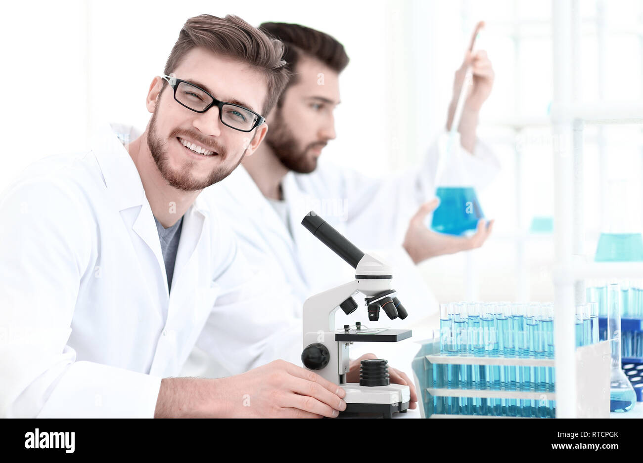 closeup. a biologist working in the laboratory Stock Photo - Alamy