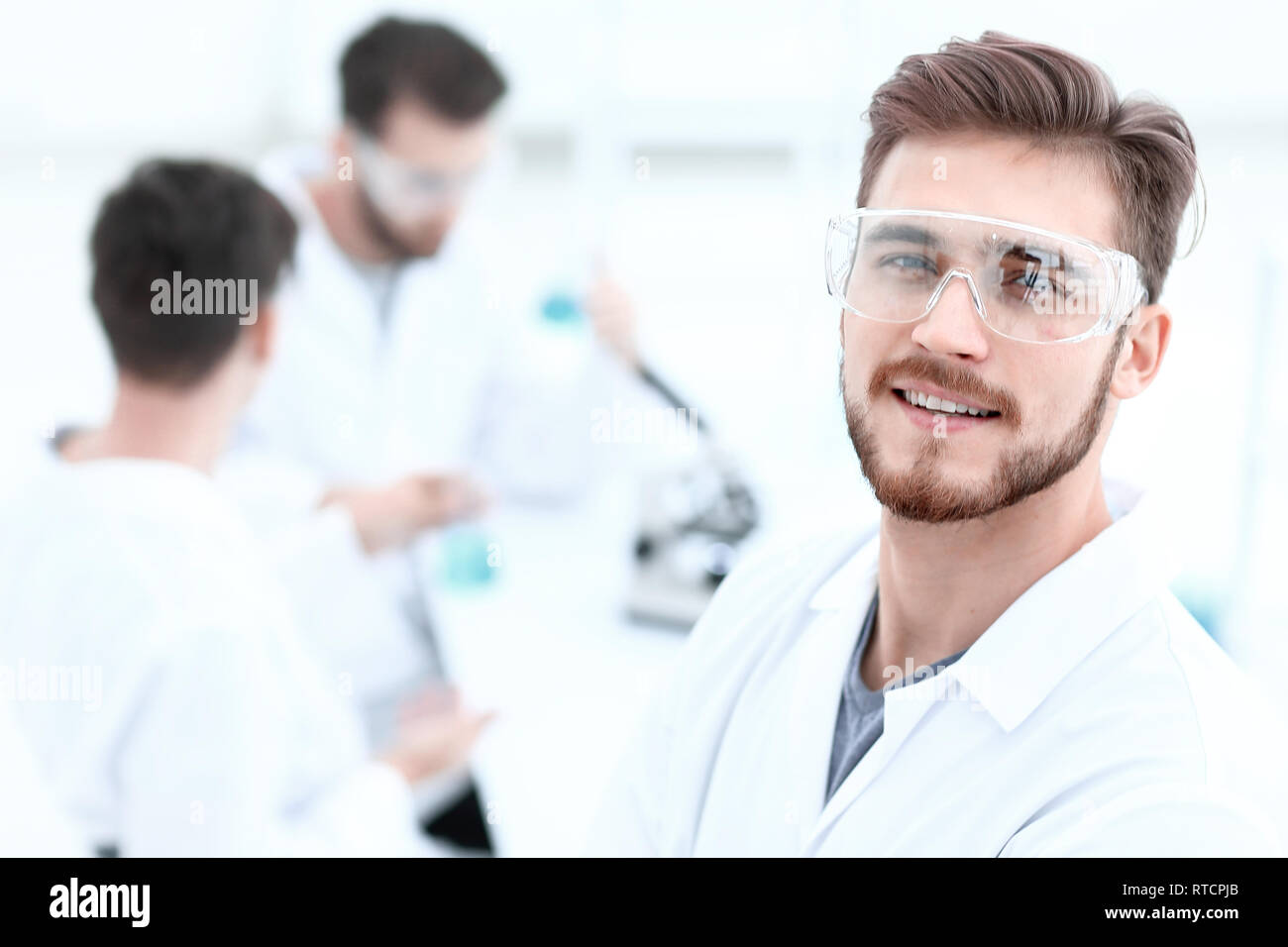 closeup.successful scientist on a light background Stock Photo - Alamy