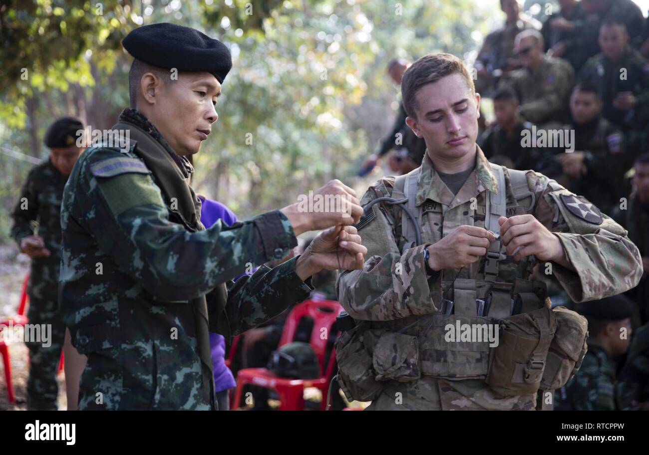 Royal Thai Armed Forces Master Sgt. 1st Class. Puvadon Pumjine, left ...
