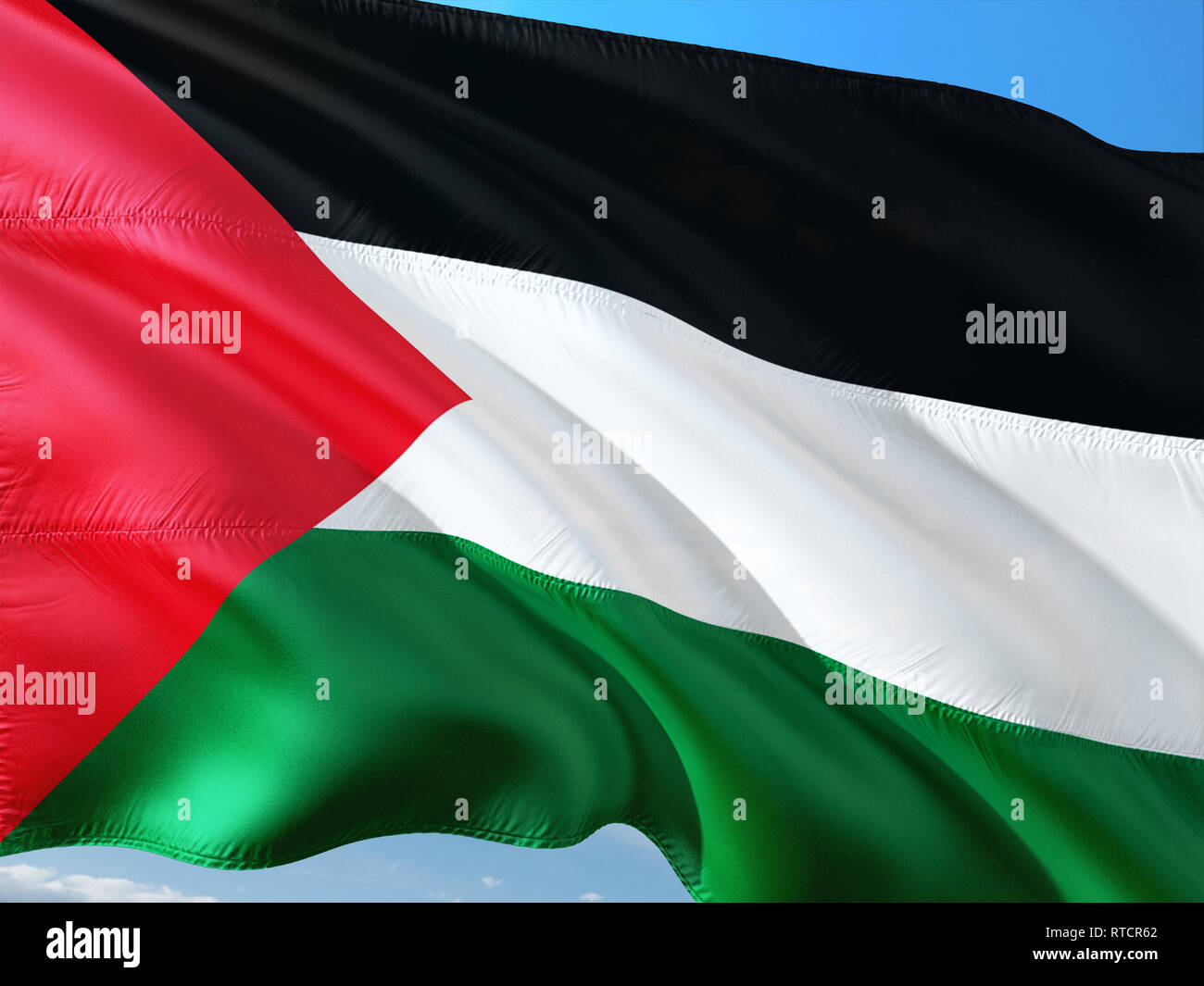 Flag of Palestine waving in the wind against deep blue sky. High ...