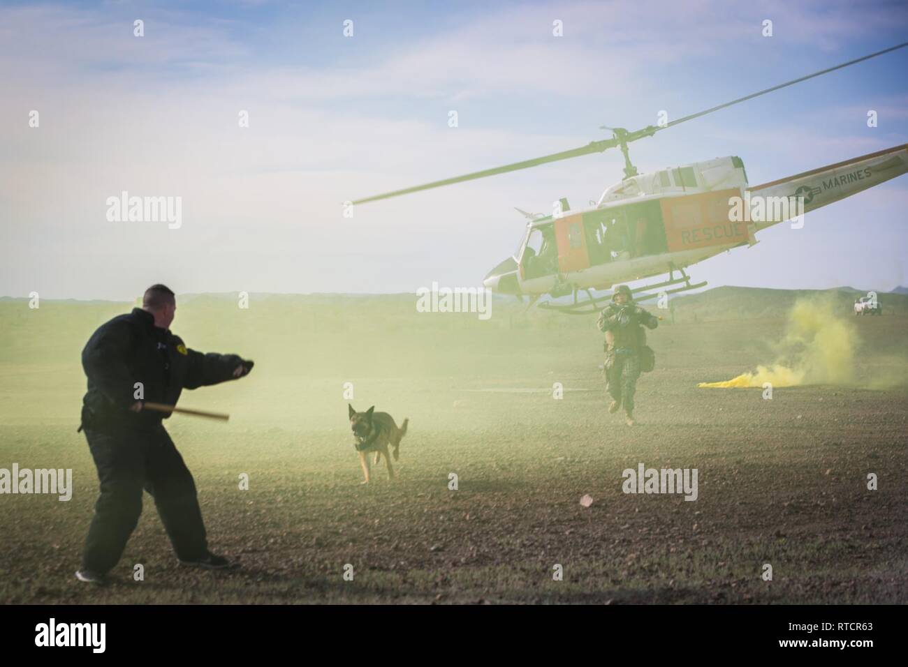 U.S. Marines assigned to the Military Working Dog (MWD) Team Deployment ...
