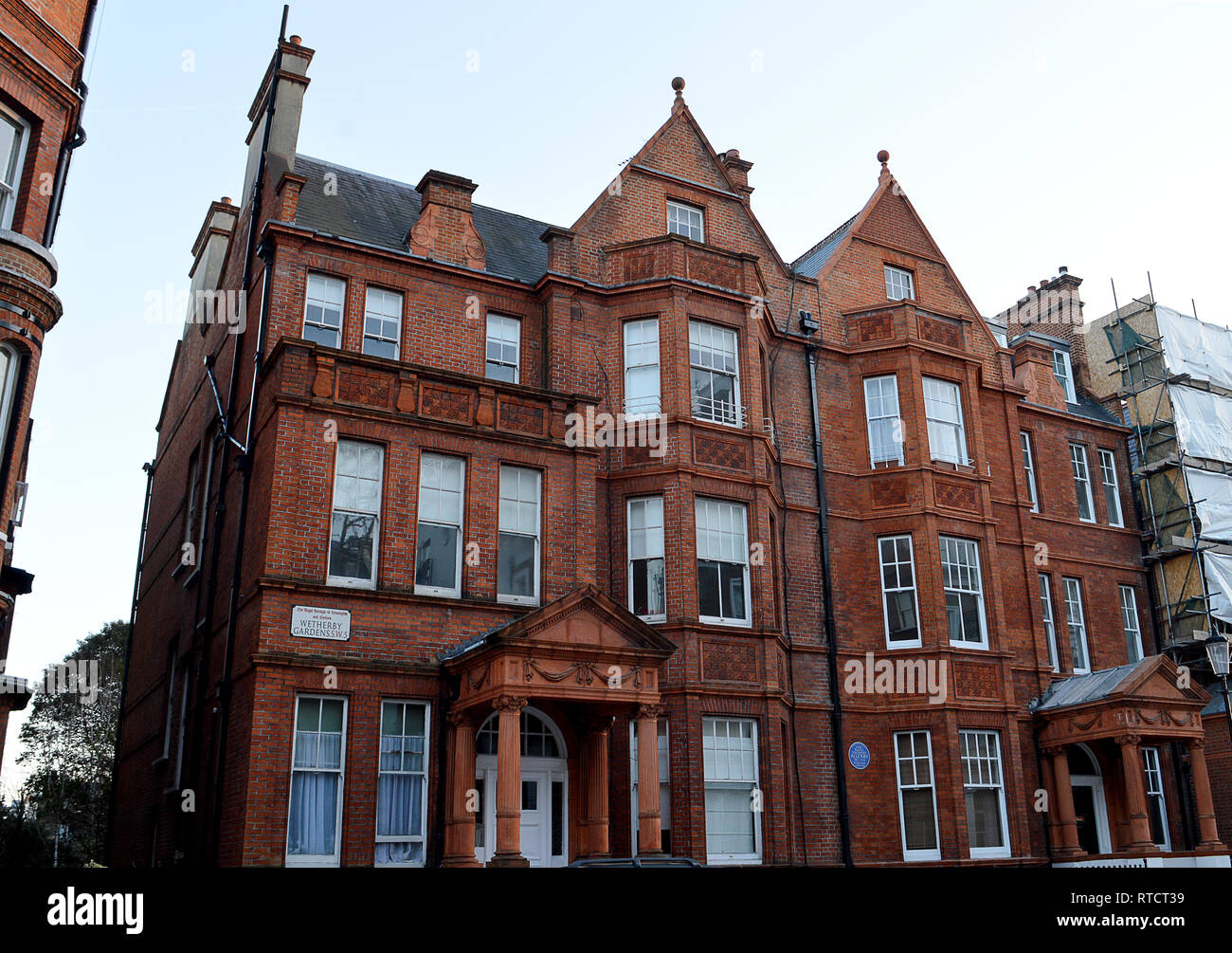 Houses in the Queen Anne style red brick buildings of Wetherby Gardens ...