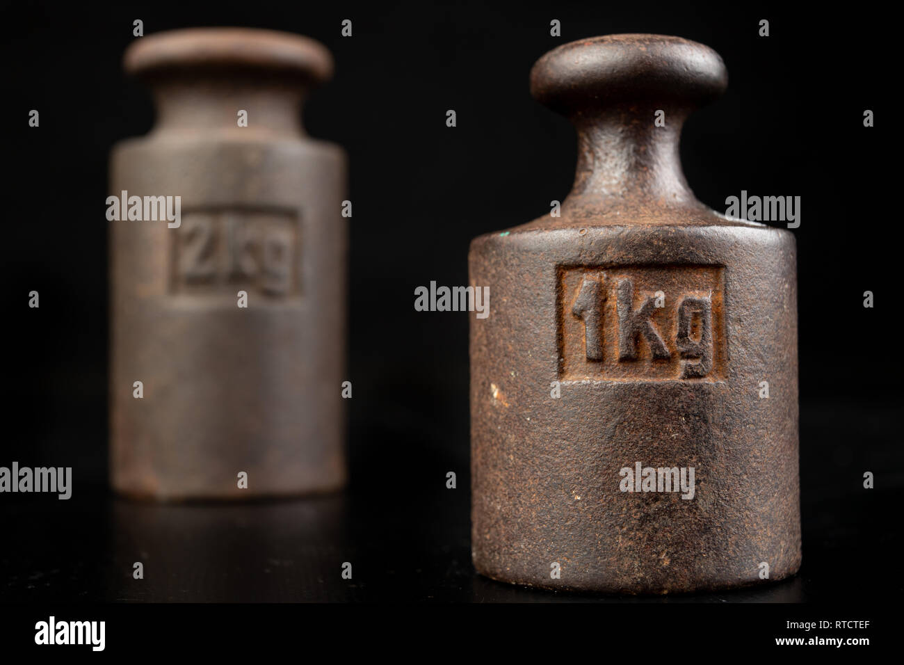 Old rusty metal weights for weighing products. Accessories for weight ...