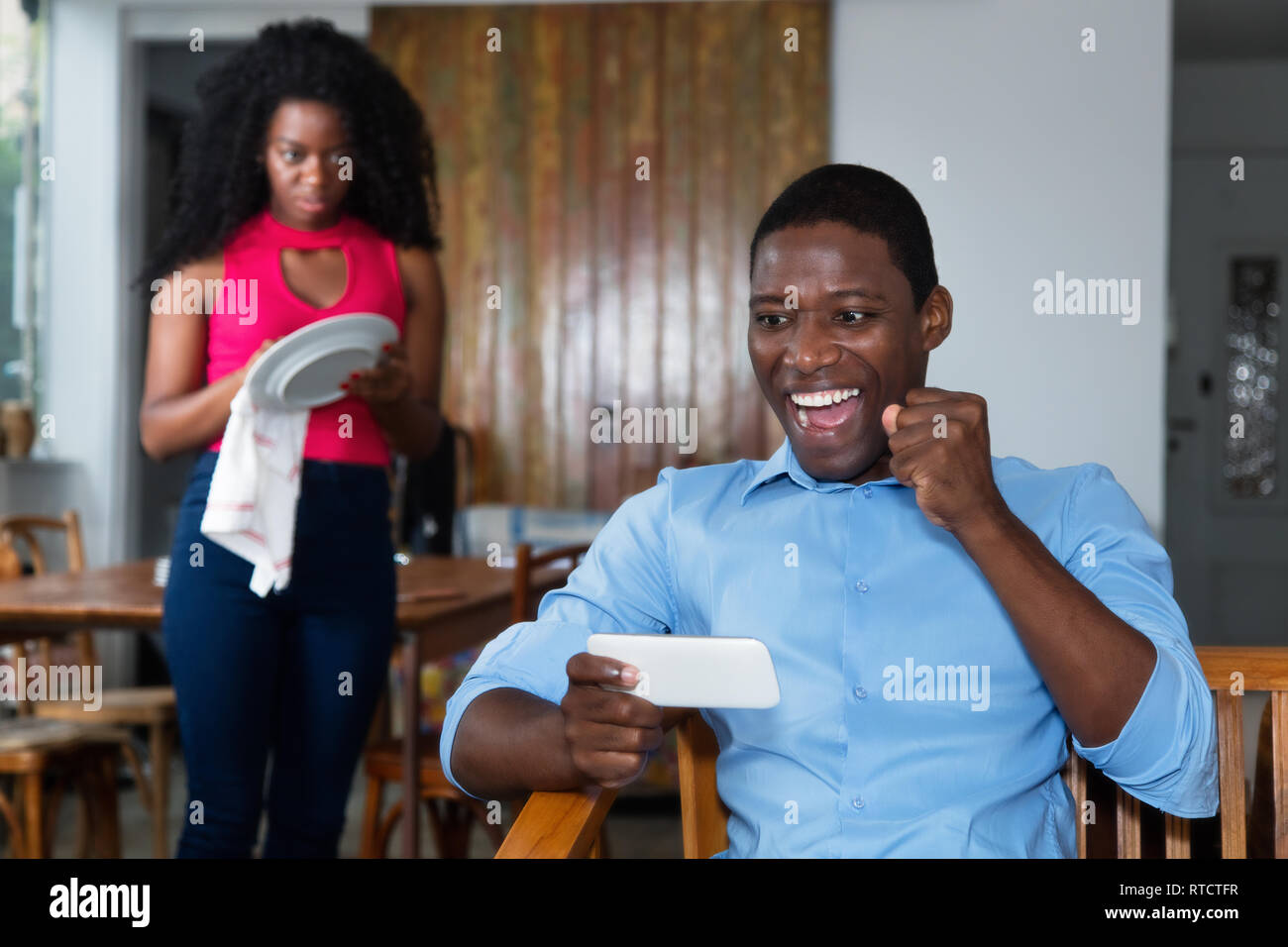 Man lazy woman housework hi-res stock photography and images - Alamy